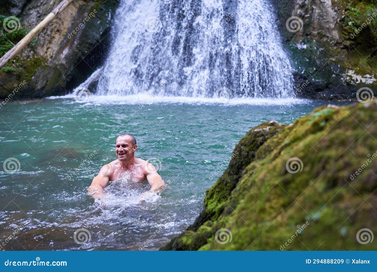 Strong Man Bathing in a Waterfall Stock Image - Image of landscape ...
