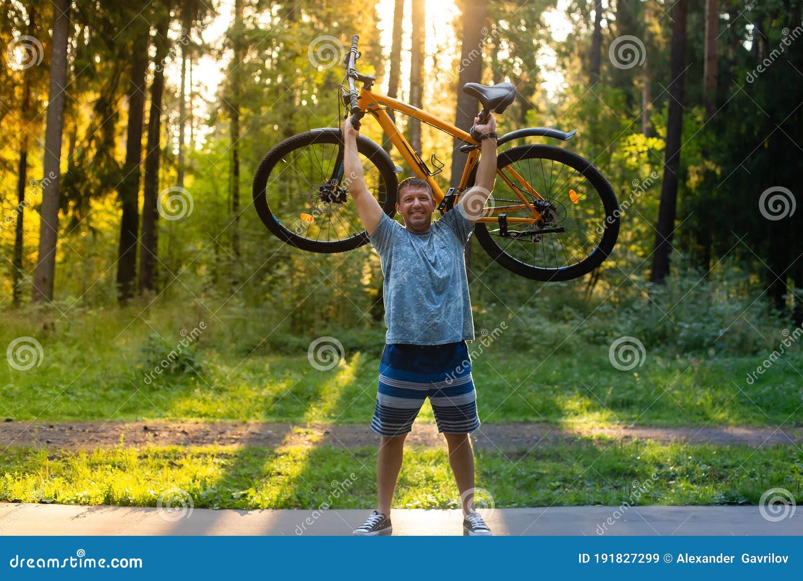 Strong Man on a Bike in the Park Stock Image - Image of cycling, park ...