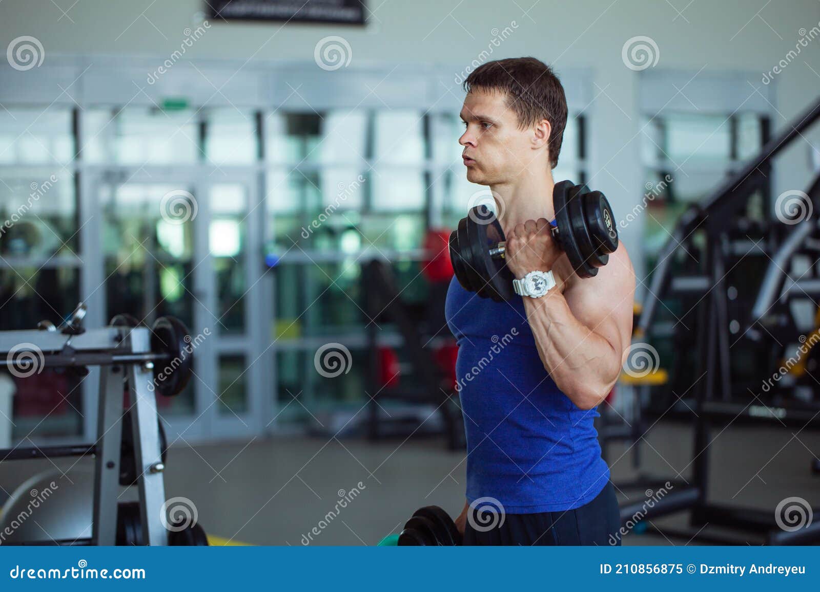 Strong Bodybuilder Exercising in a Gym Stock Image - Image of ...