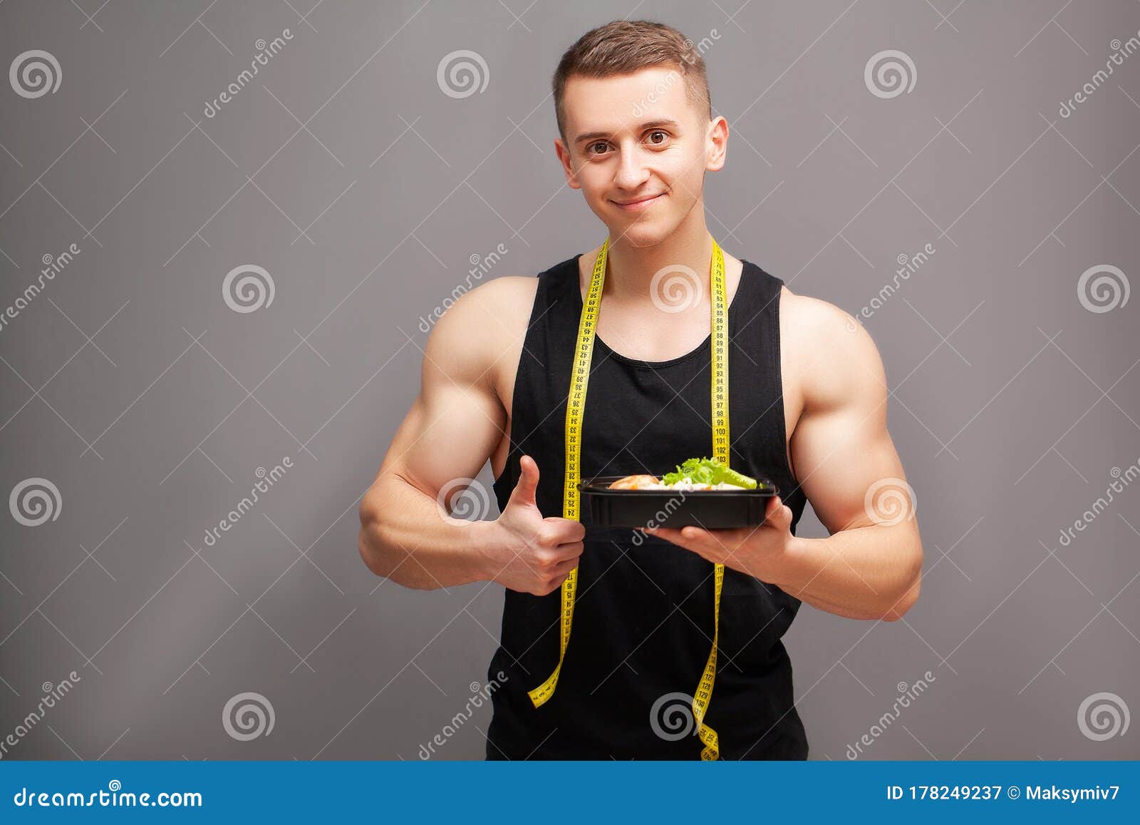 Strong Man Consumes a High-protein Meal of Meat and Fruit Stock Image ...
