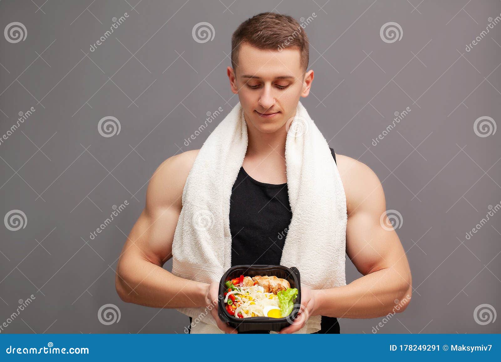 Strong Man Consumes a High-protein Meal of Meat and Fruit Stock Image ...