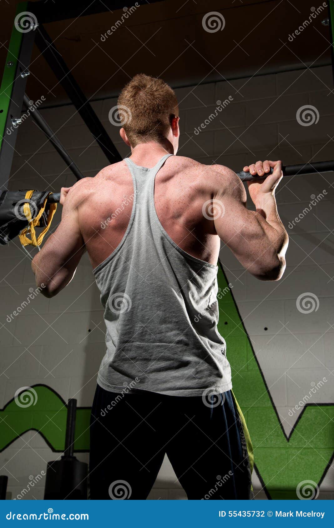 Strong Man Exercising in Dramatic Light Stock Photo - Image of coach ...