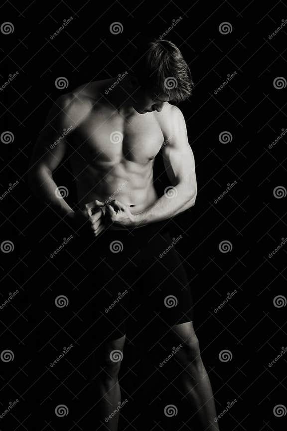 Strong man flexing stock photo. Image of male, flexing - 17908744