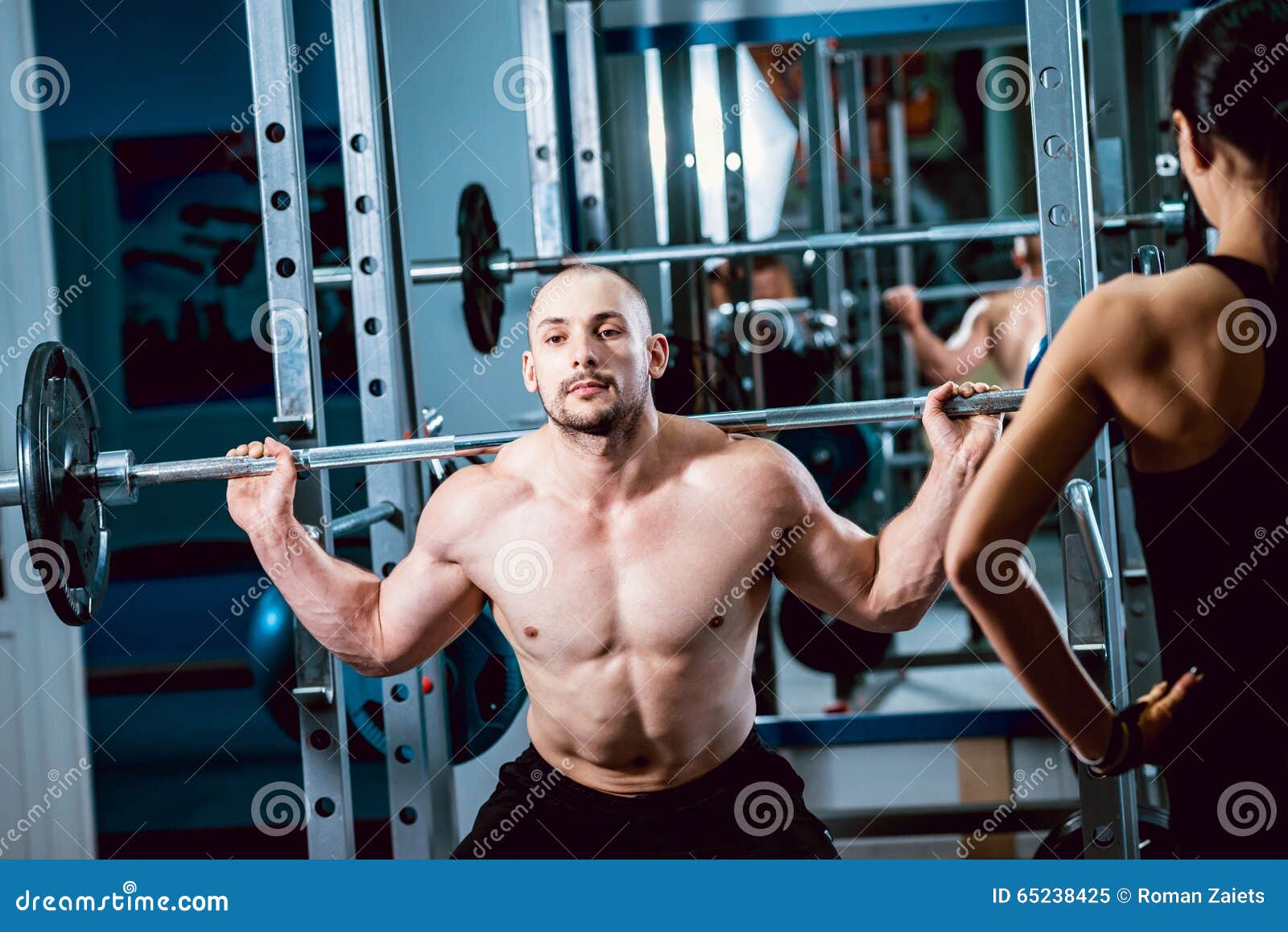 The strong man in the gym stock image. Image of motion - 65238425