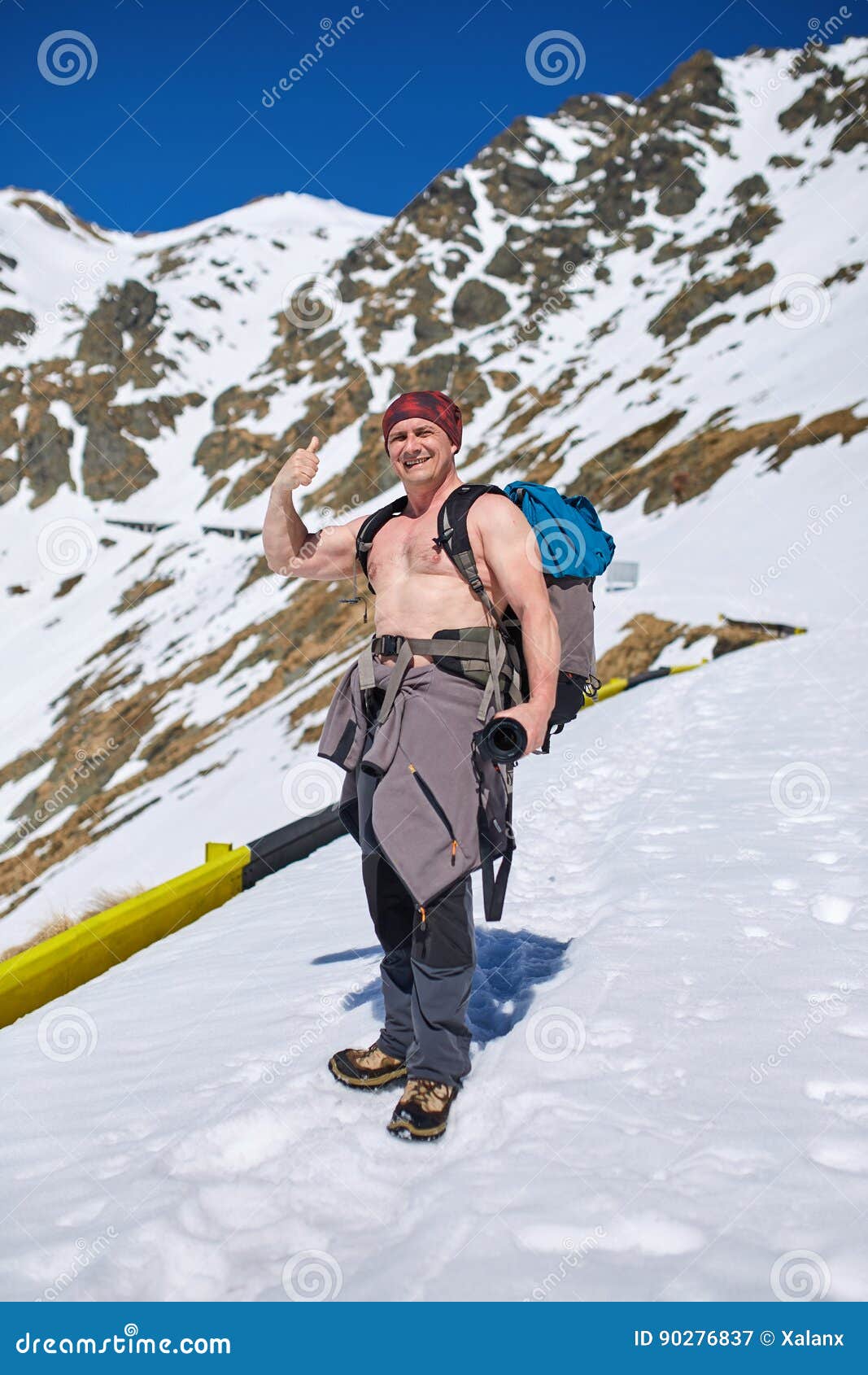 Strong man hiking stock image. Image of active, snow - 90276837