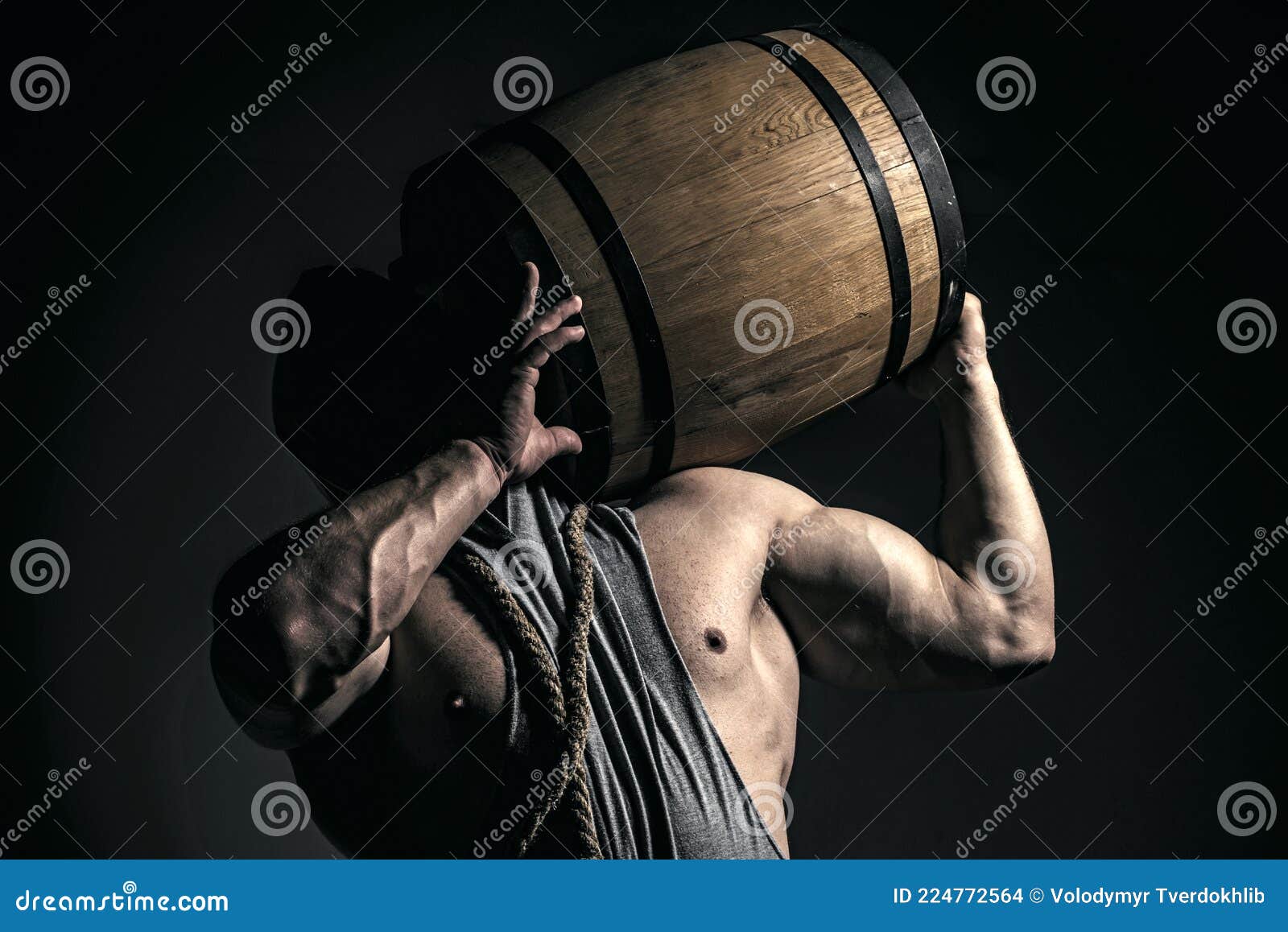 Strong Man Holds Barrel Isolated on Black. Stock Photo - Image of board ...