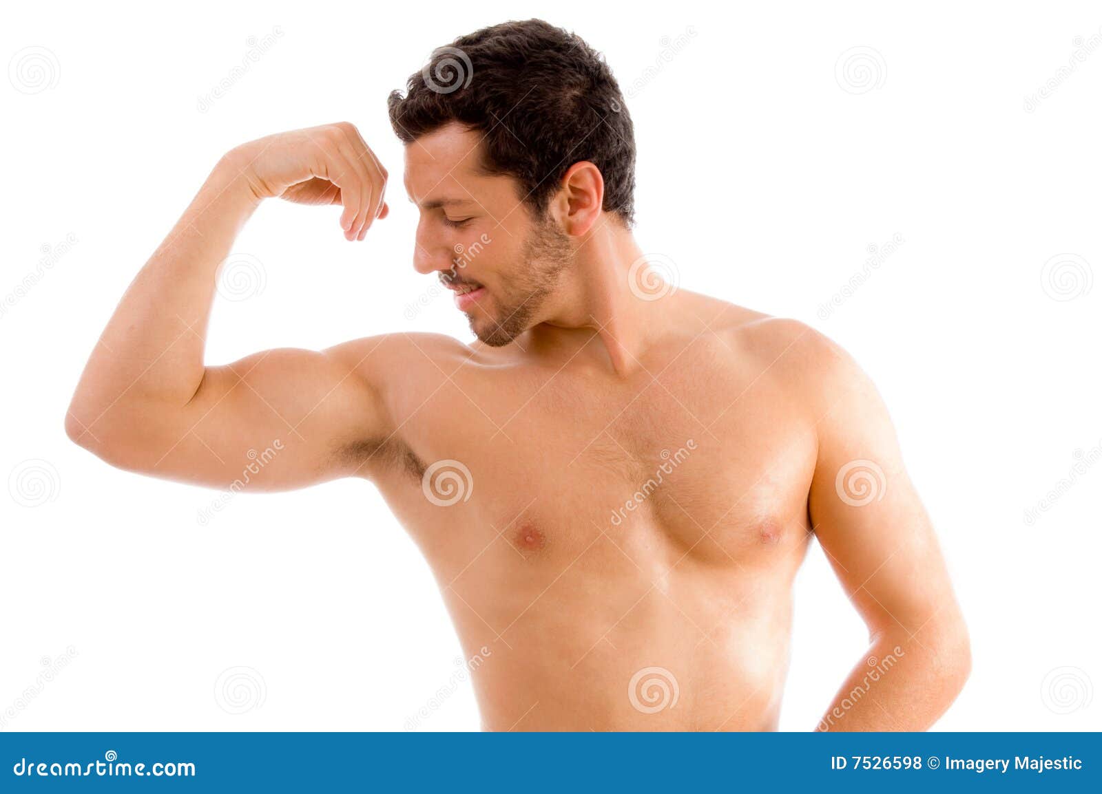 Strong Man Looking His Muscles Stock Photo - Image of indoors, isolated ...