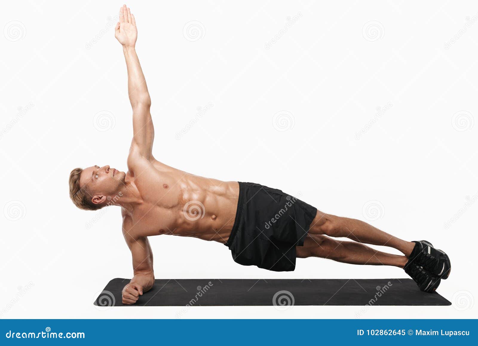 Strong Man Lying and Exercising Stock Image - Image of slim, strength ...