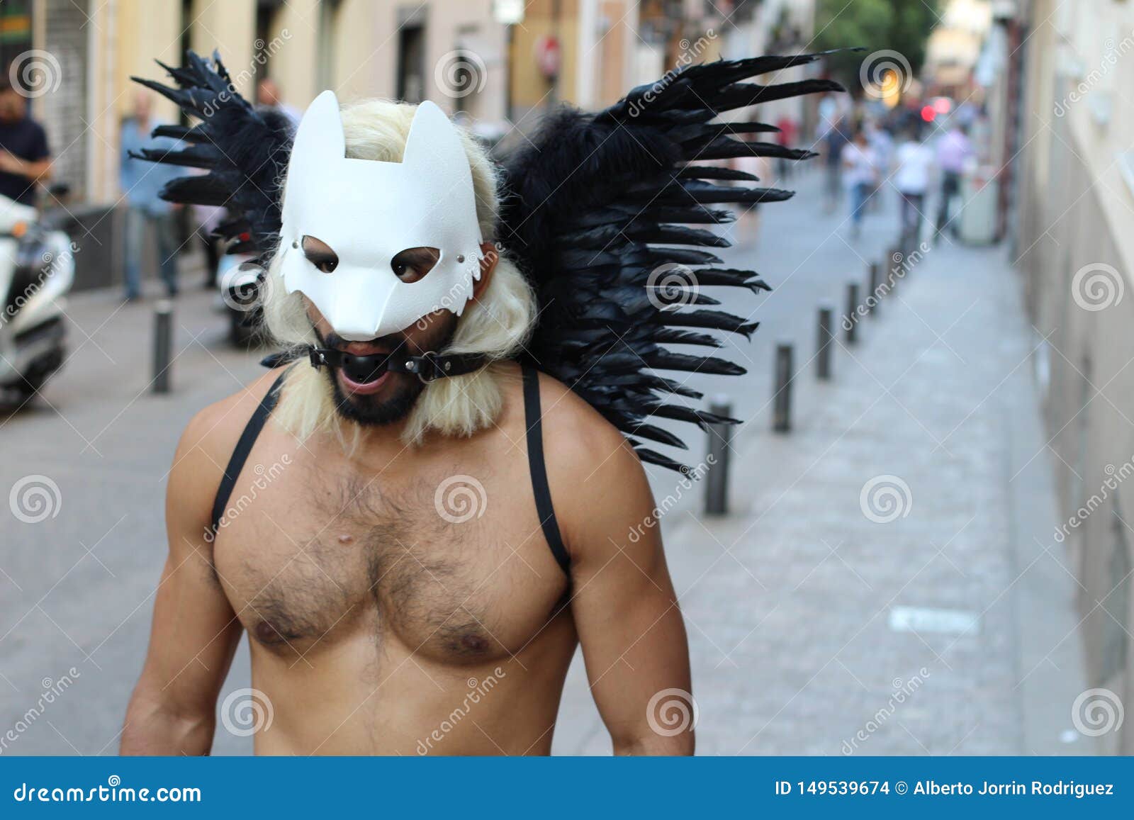 Strong Man with Mask and Wings Outdoors Stock Photo - Image of horror ...