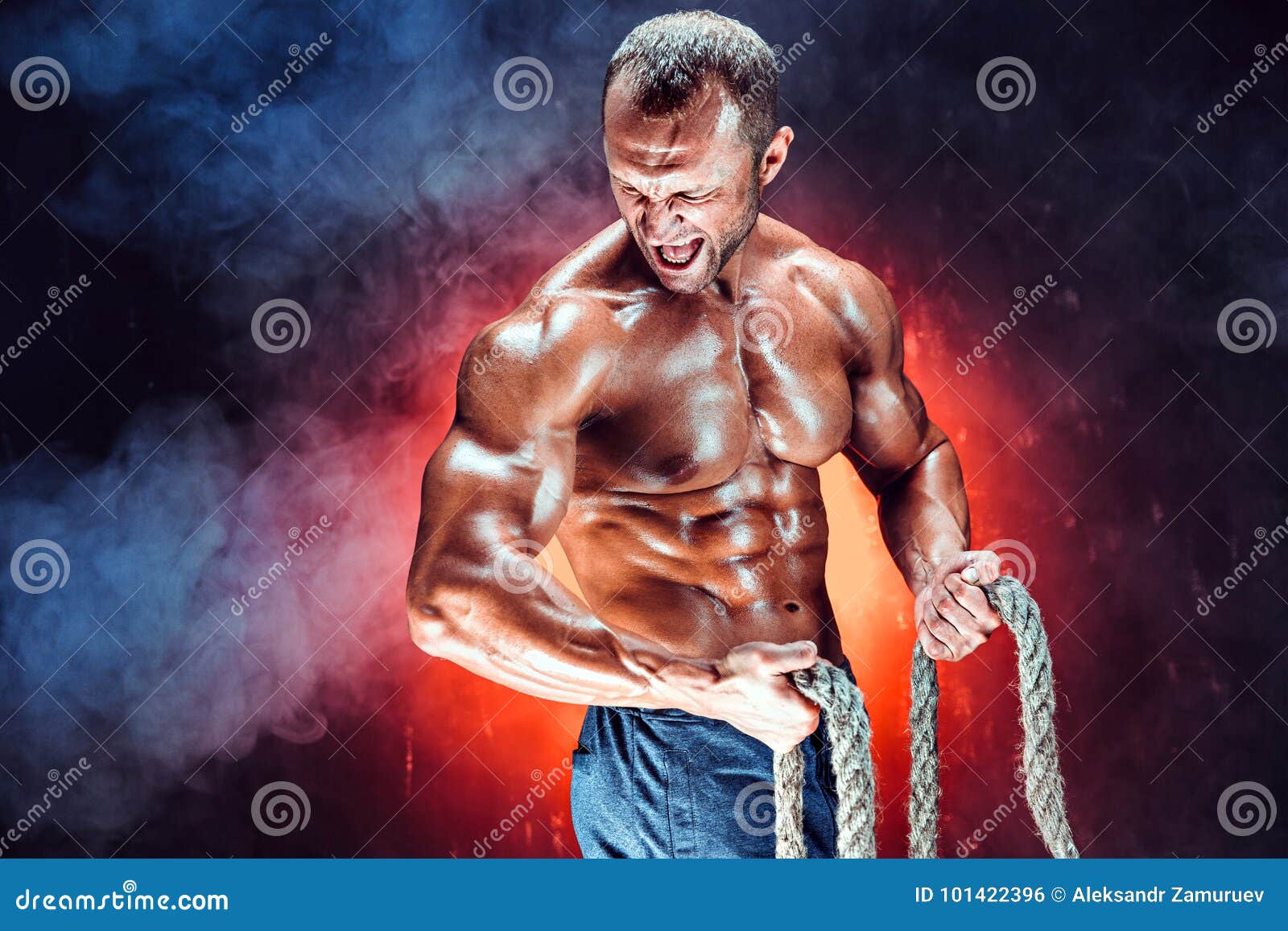 Strong man with rope stock photo. Image of lifestyle - 101422396