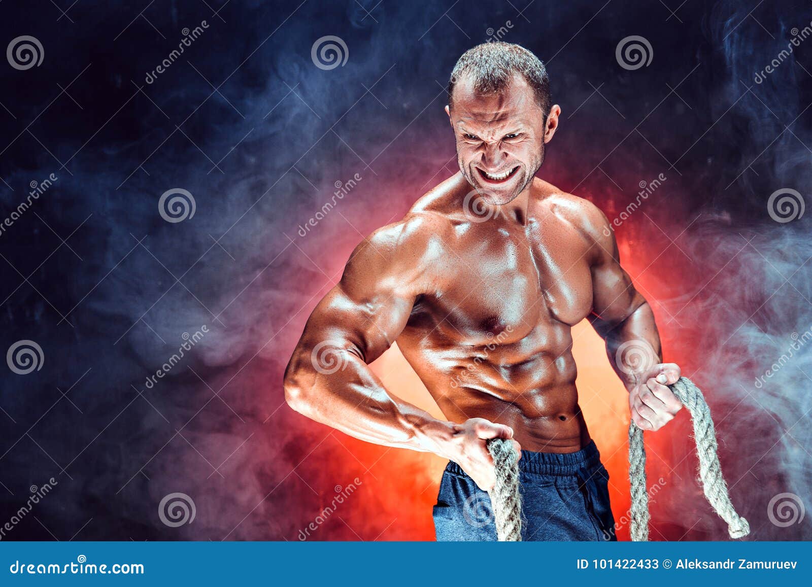 Strong man with rope stock image. Image of muscle, active - 101422433