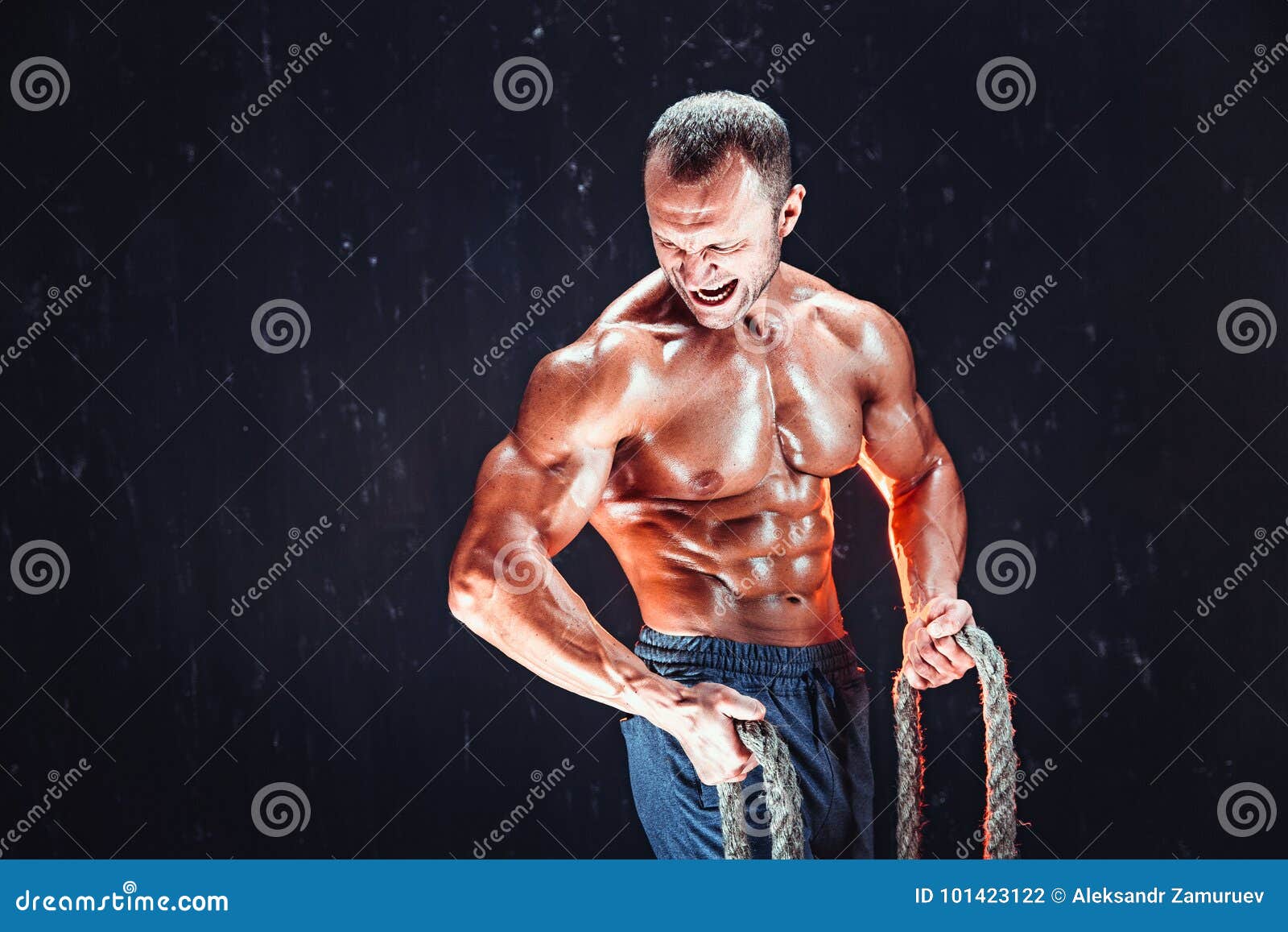 Strong man with rope stock photo. Image of fitness, physical - 101423122