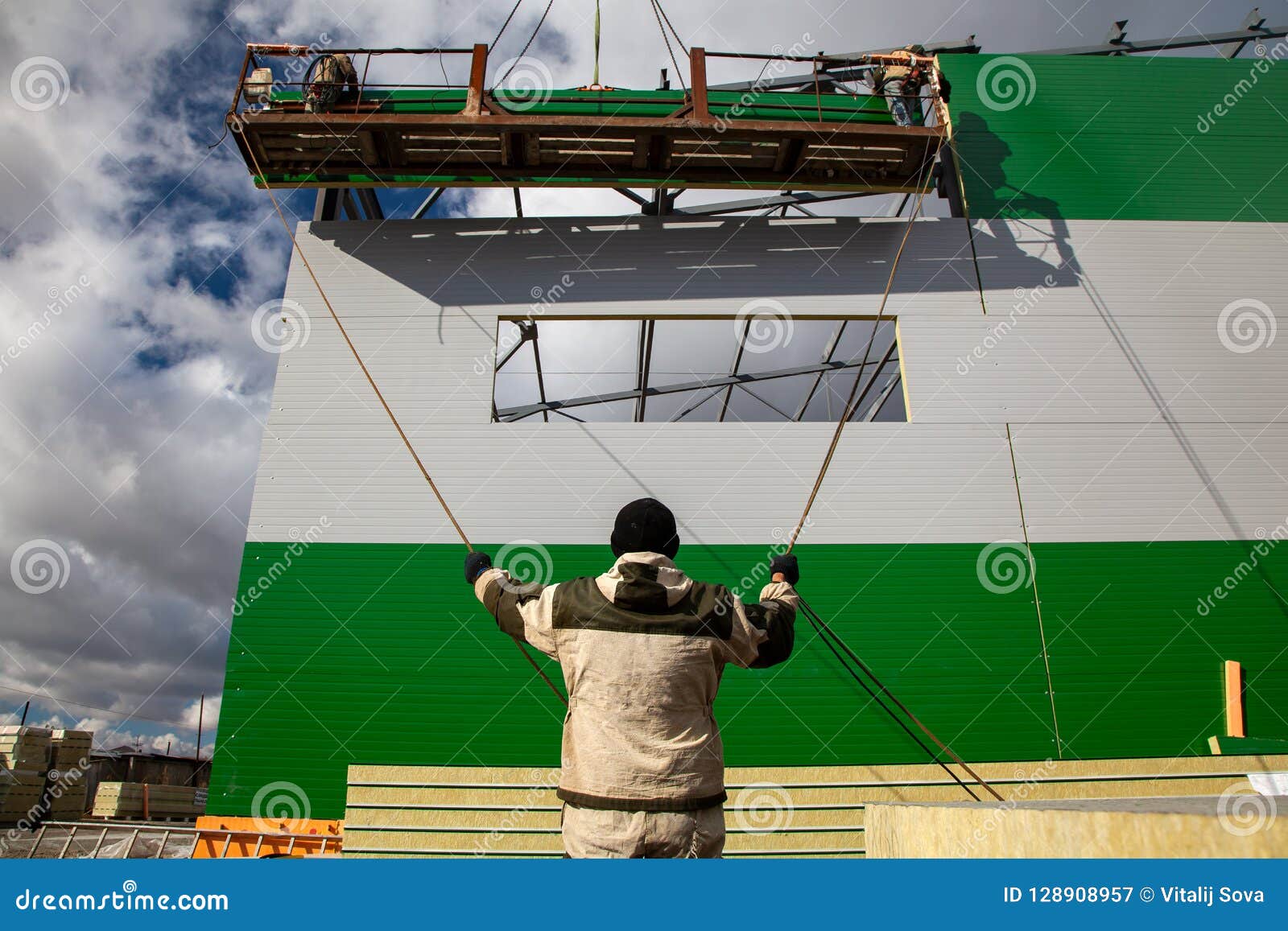 A strong man is a welder stock image. Image of builder - 128908957