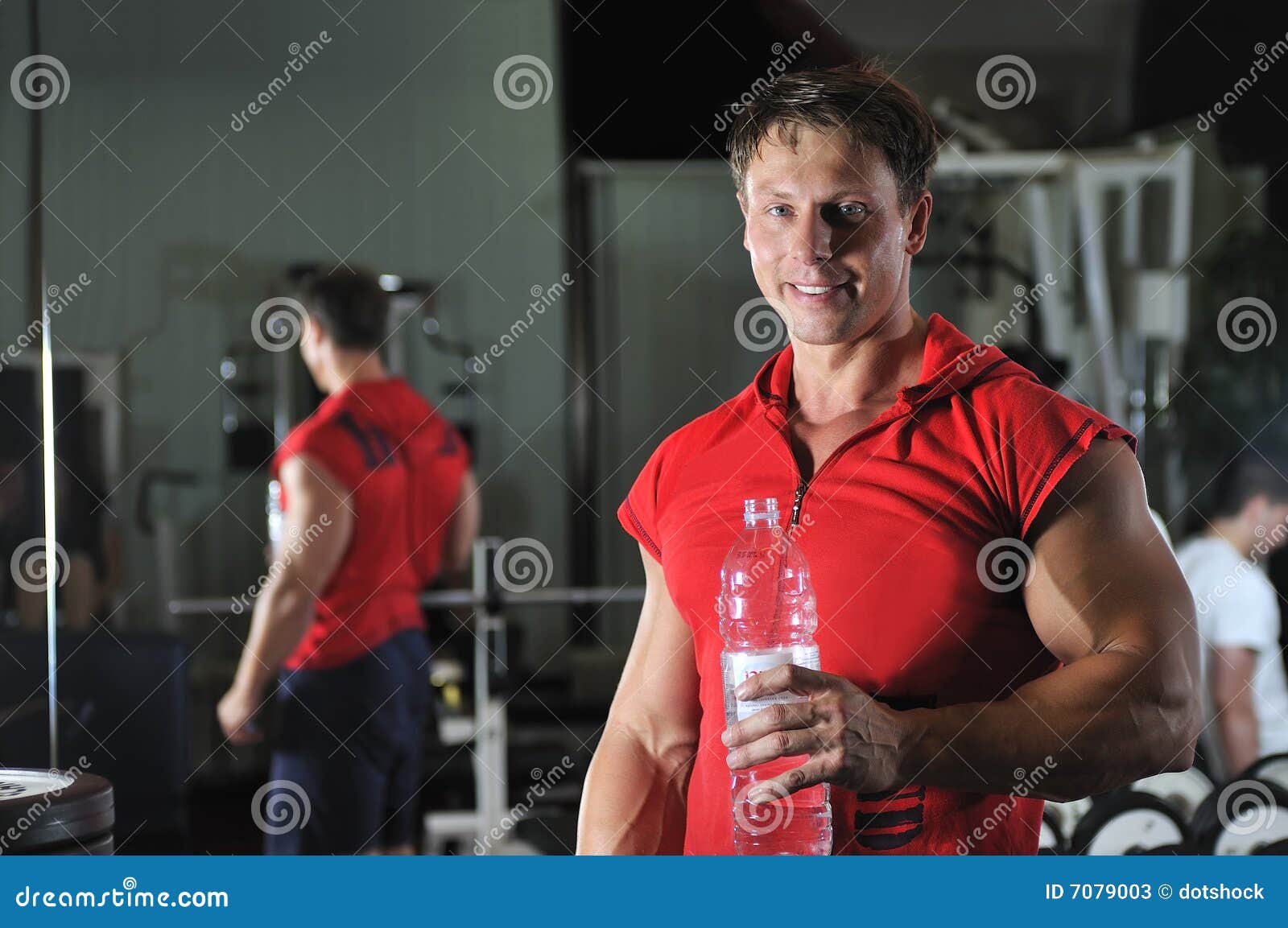 Strong man work out in gym stock image. Image of activity - 7079003