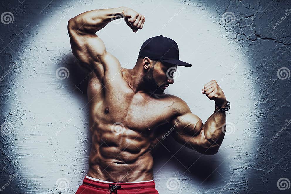 Strong man stock image. Image of masculinity, indoors - 99183729