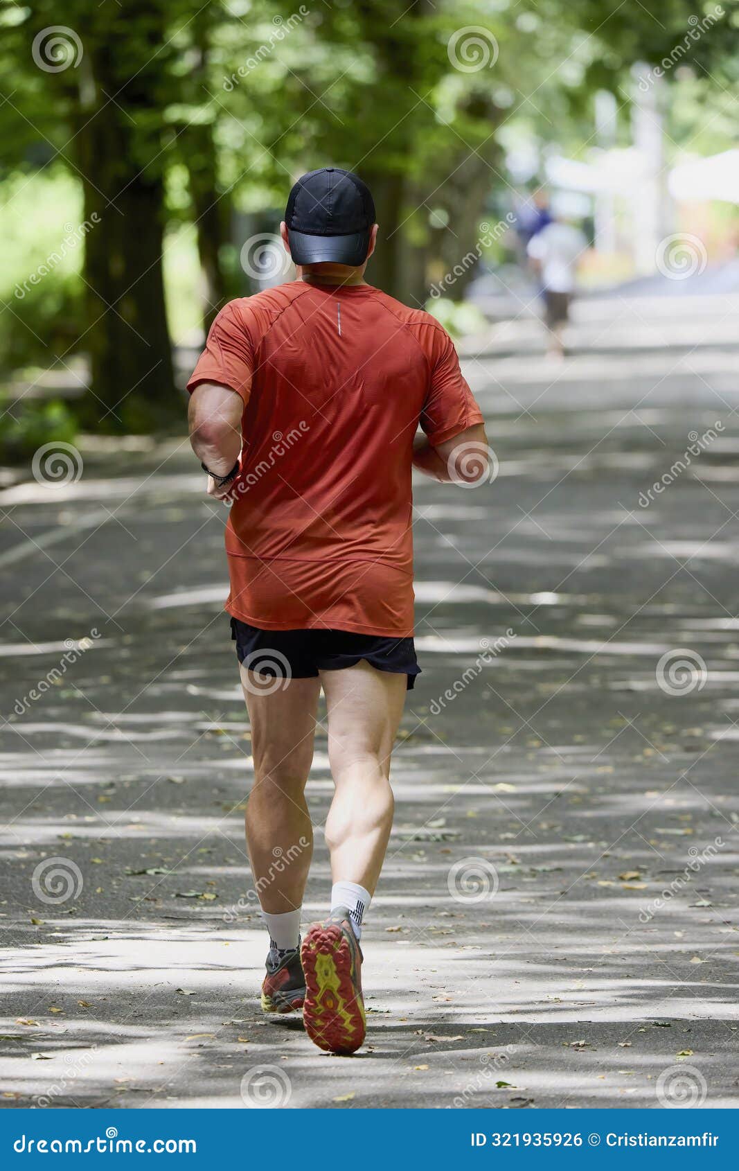 Middle-aged Man Running through the Forest Stock Photo - Image of ...