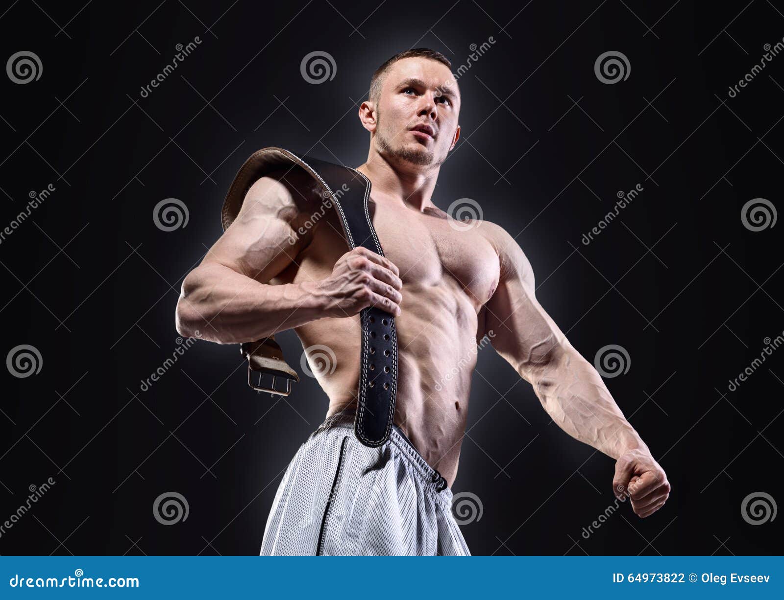 Strong Muscular Man with Lifting Belt Posing Over Stock Photo - Image ...