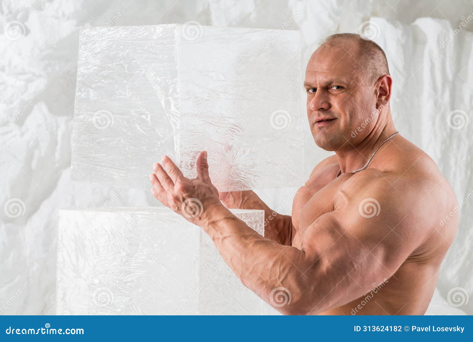 A Strong Muscular Man in Studio with Ice Stock Photo - Image of beauty ...