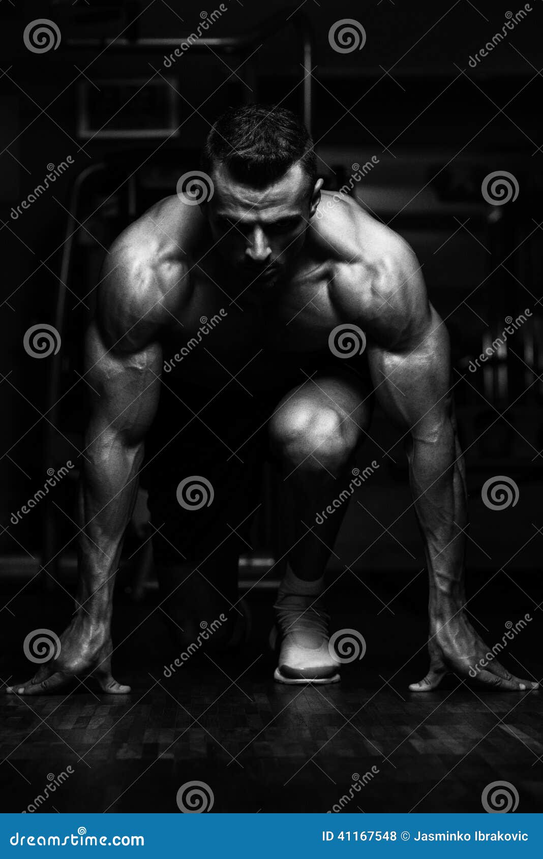 Strong Muscular Men Kneeling on the Floor Stock Photo - Image of build ...