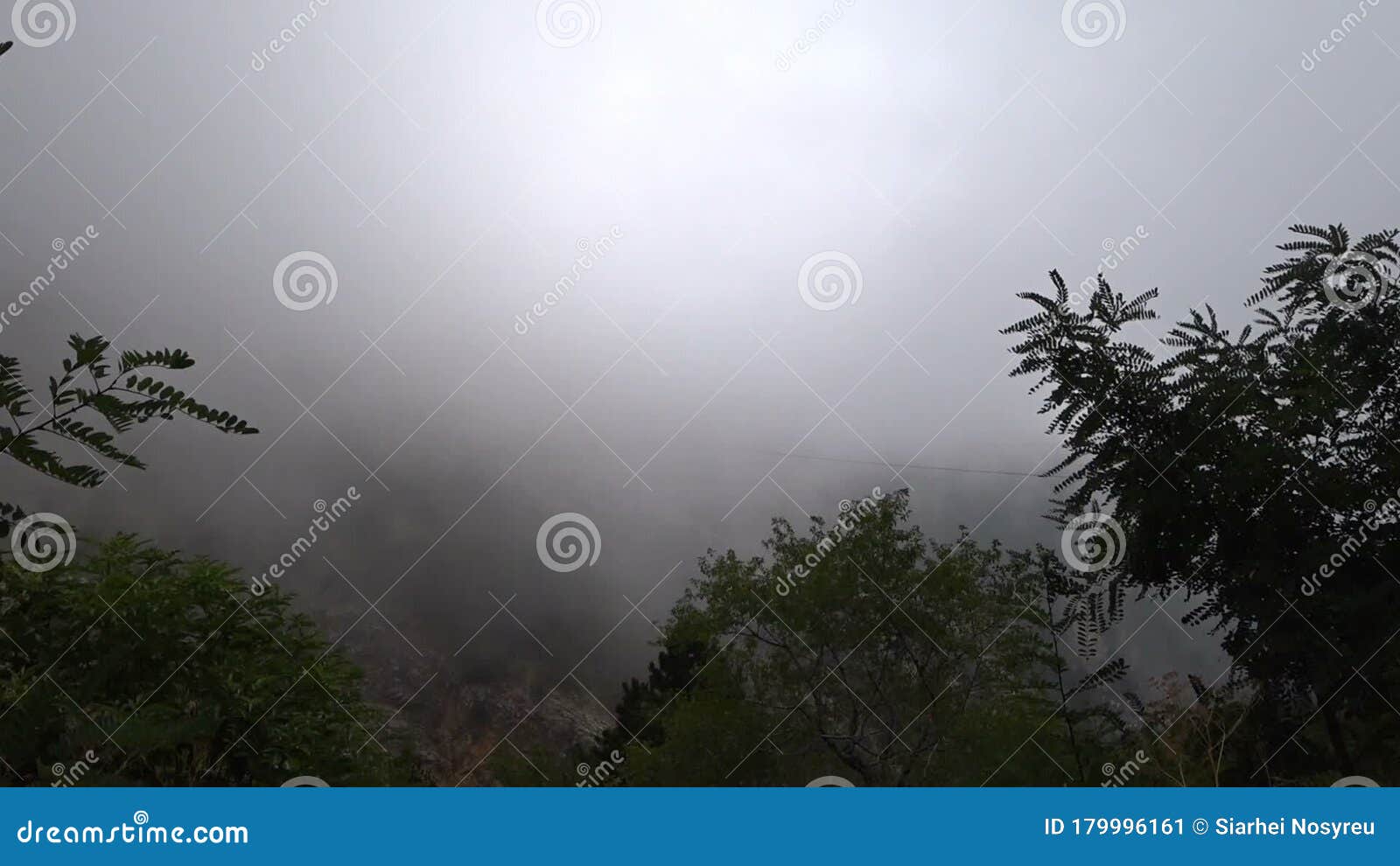 Strong Wind Blows, Poor Visibility Due To Clouds Moving on the Rock ...