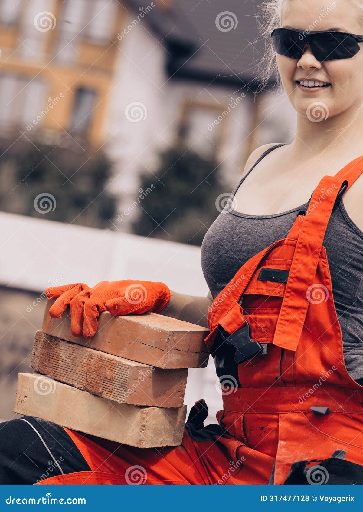 Strong Woman Building Using Bricks Stock Photo - Image of work ...