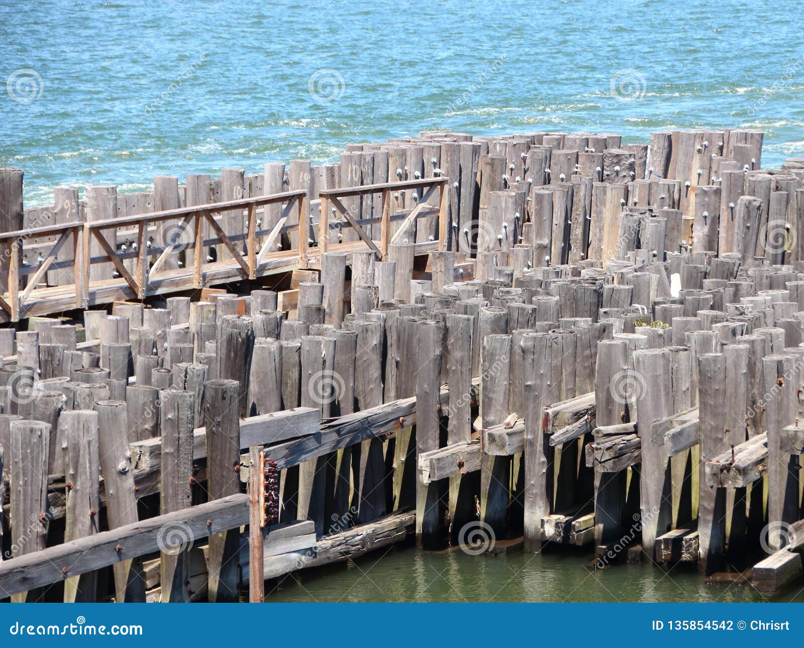 Strong Wooden Pier with Large Tree Poles Stock Photo - Image of lumber ...