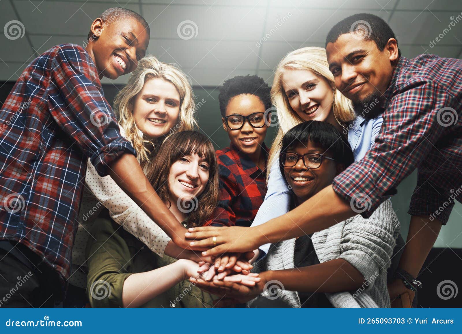 We are Stronger As a Team. a Group of Cheerful Work Colleagues Forming ...