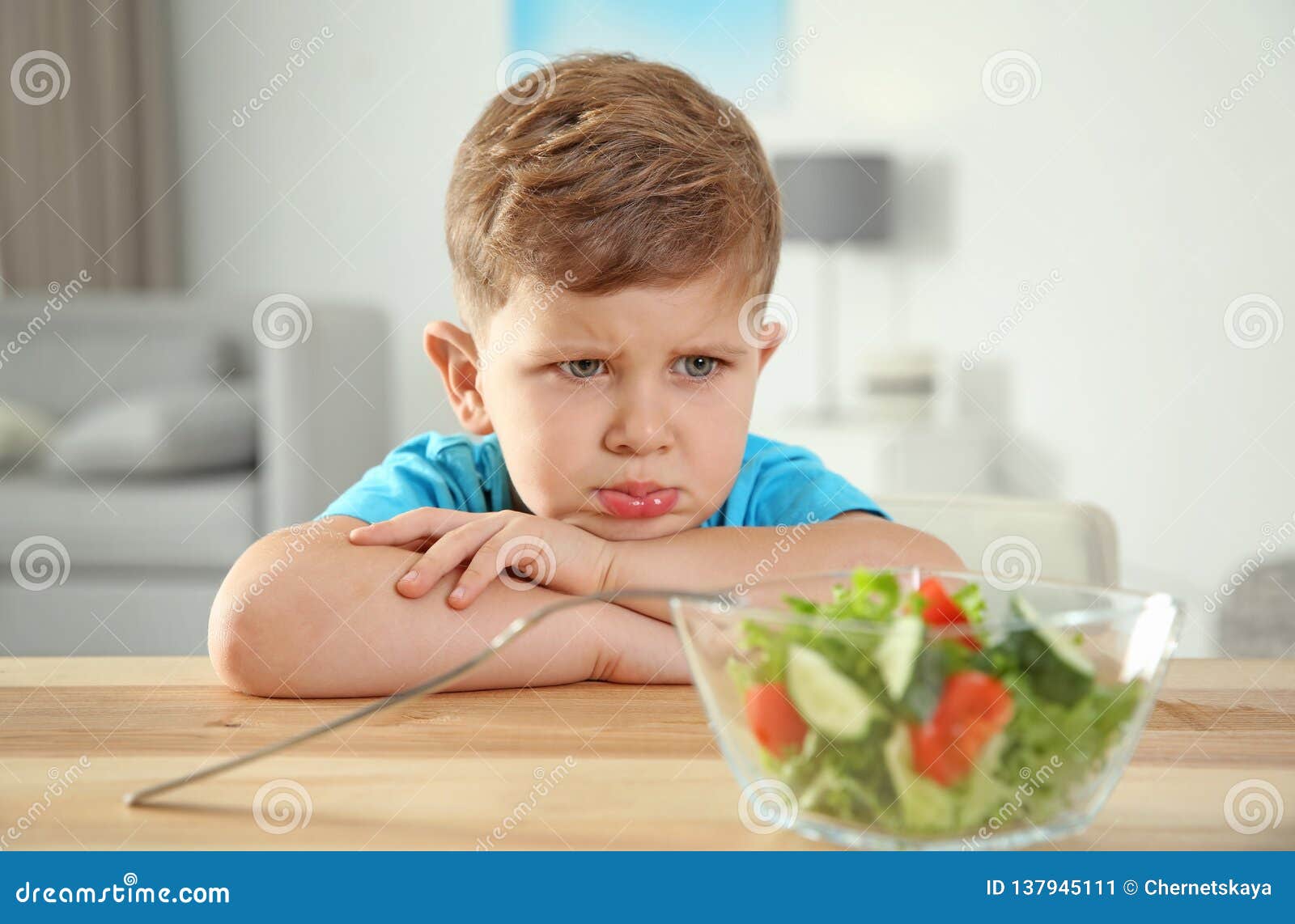 Stroppy Little Boy with Bowl of Vegetable Salad at Table Stock Image ...