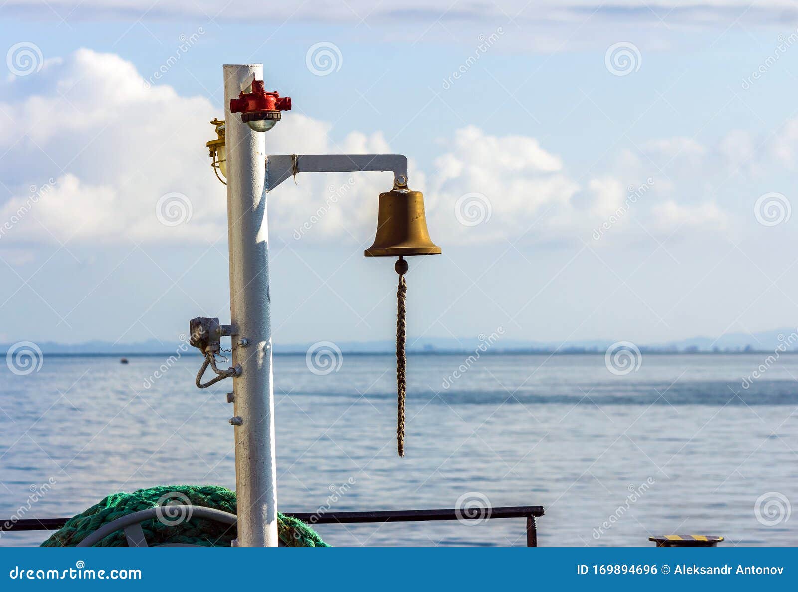 Structural Element Ship Bell on the Background of the Sea and Clouds ...