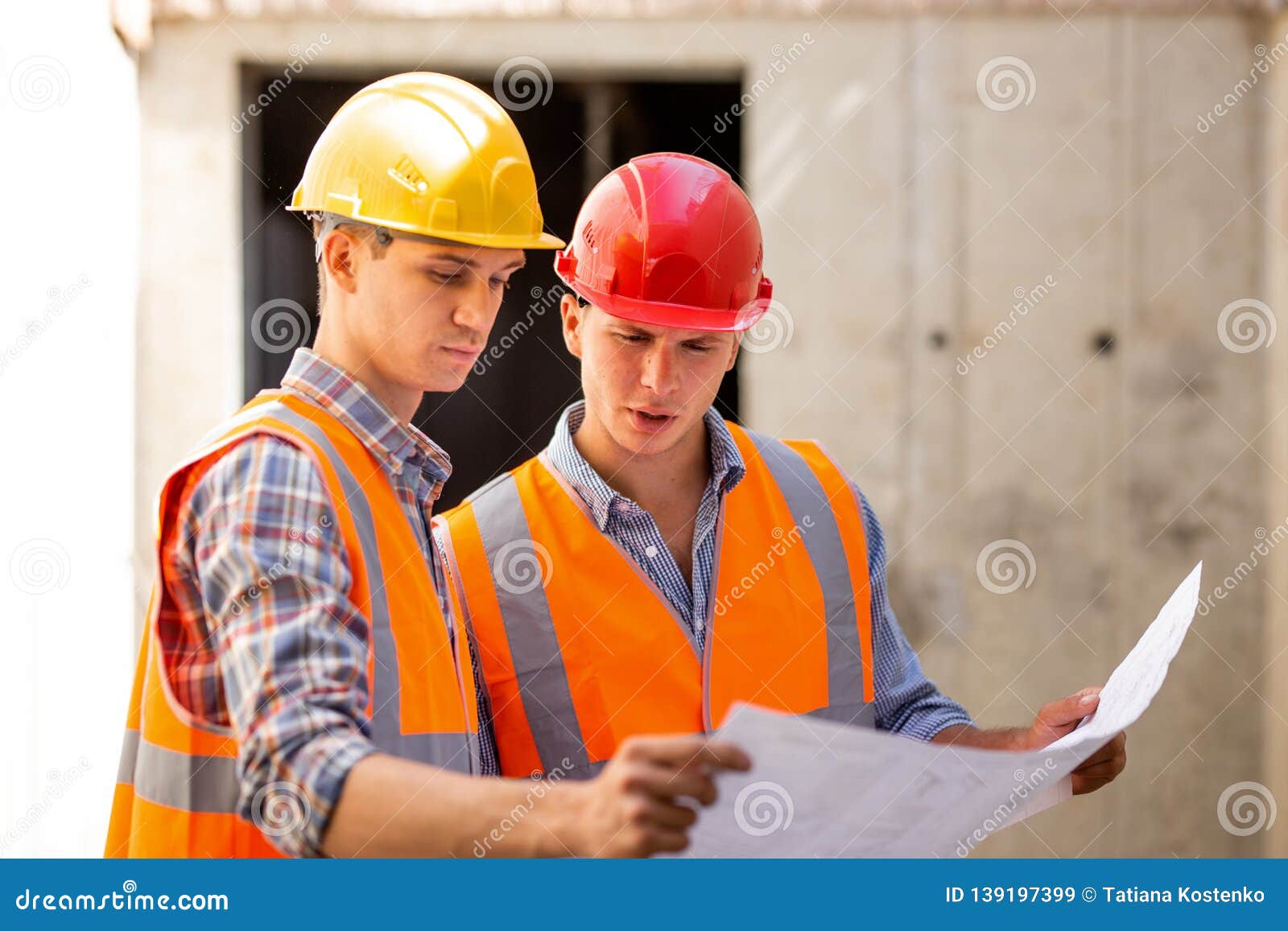 Structural Engineer and Construction Manager Dressed in Work Clothes ...