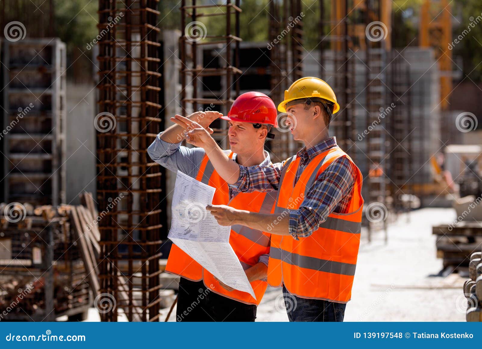 Structural Engineer and Construction Manager in Orange Work Vests and ...