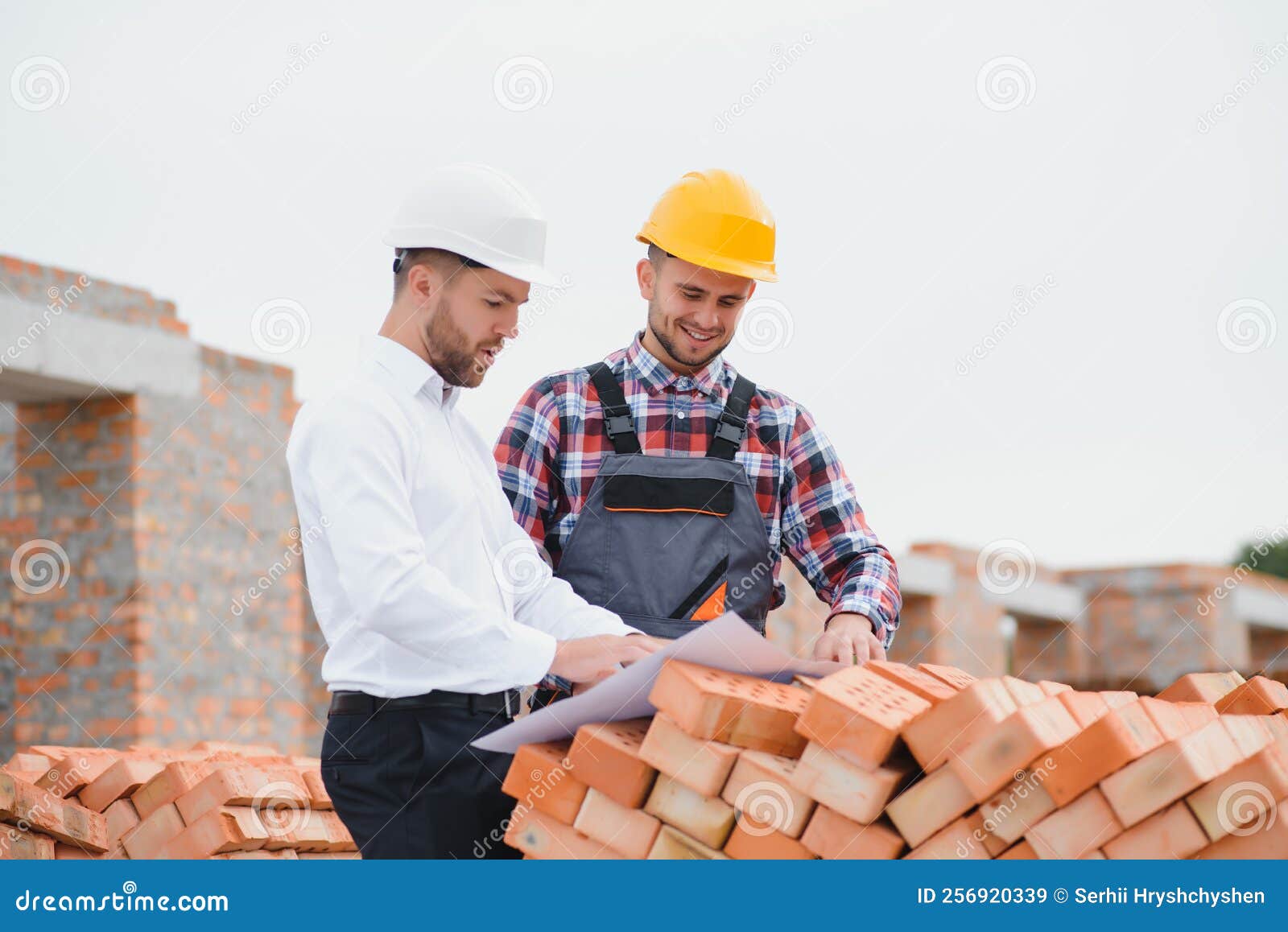 Structural Engineer and Foreman Worker Discuss, Plan Working for the ...