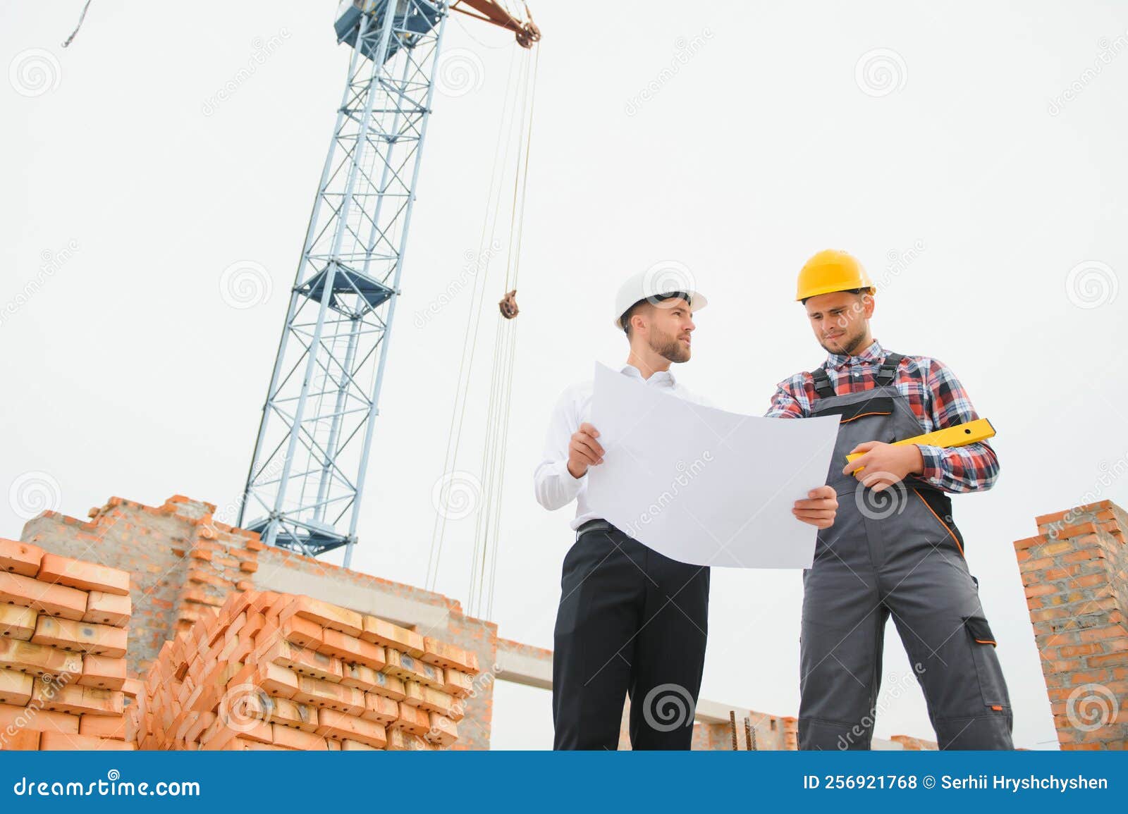 Structural Engineer and Foreman Worker Discuss, Plan Working for the ...