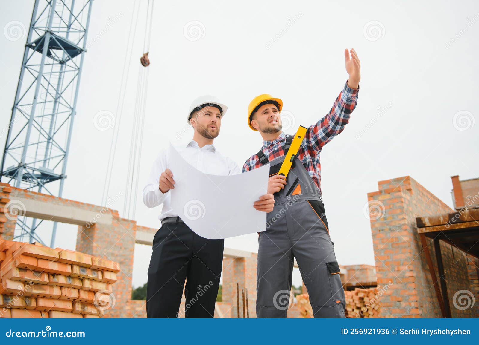 Structural Engineer and Foreman Worker Discuss, Plan Working for the ...
