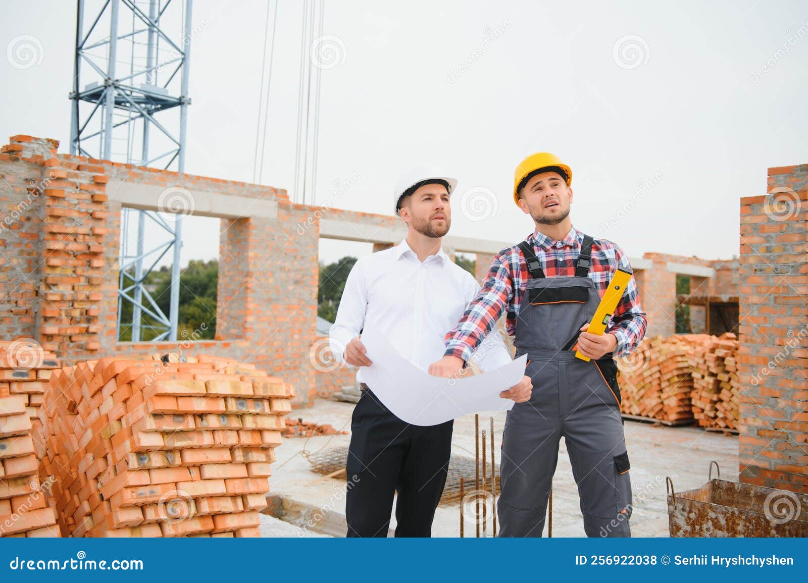 Structural Engineer and Foreman Worker Discuss, Plan Working for the ...