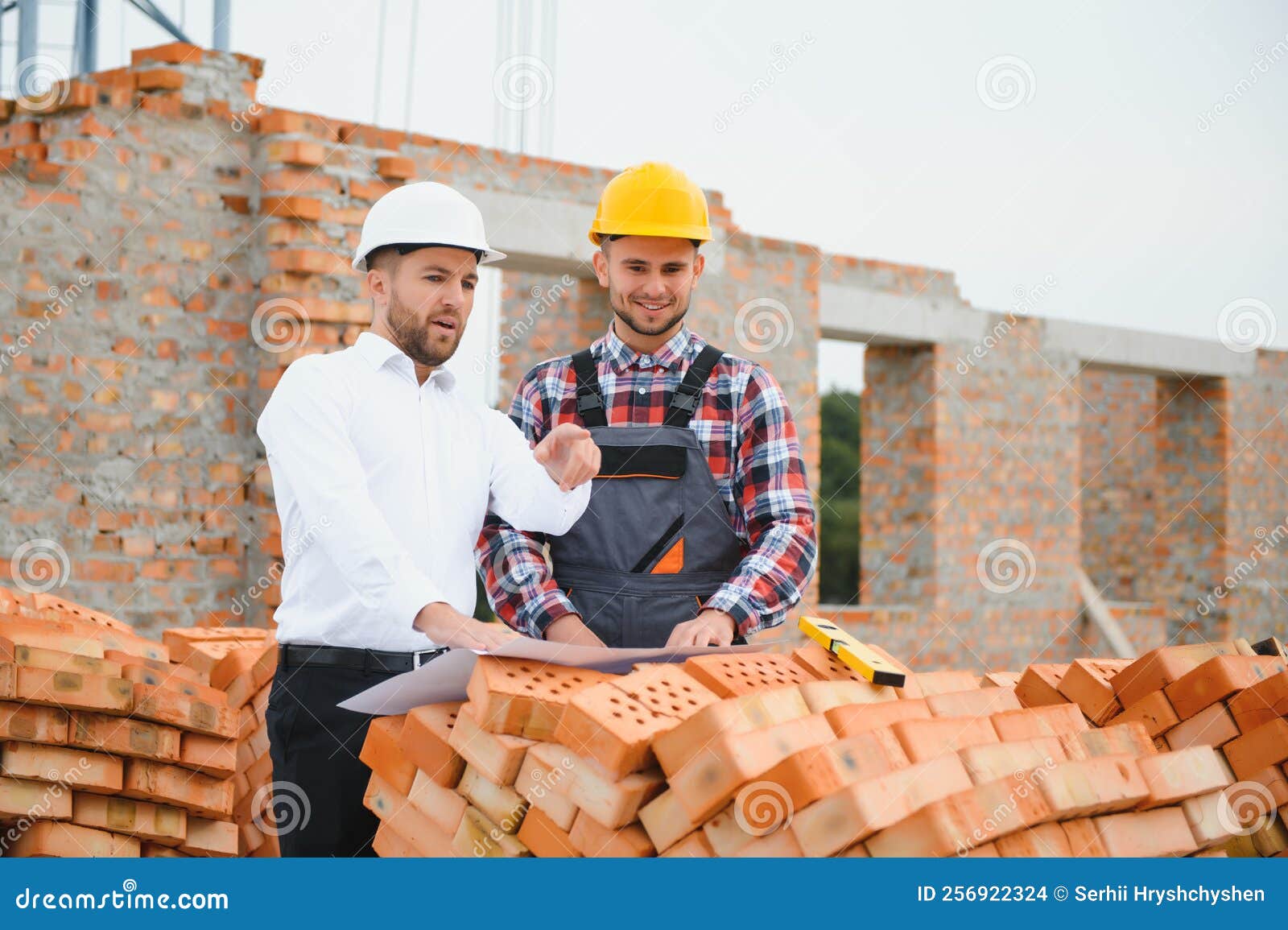 Structural Engineer and Foreman Worker Discuss, Plan Working for the ...
