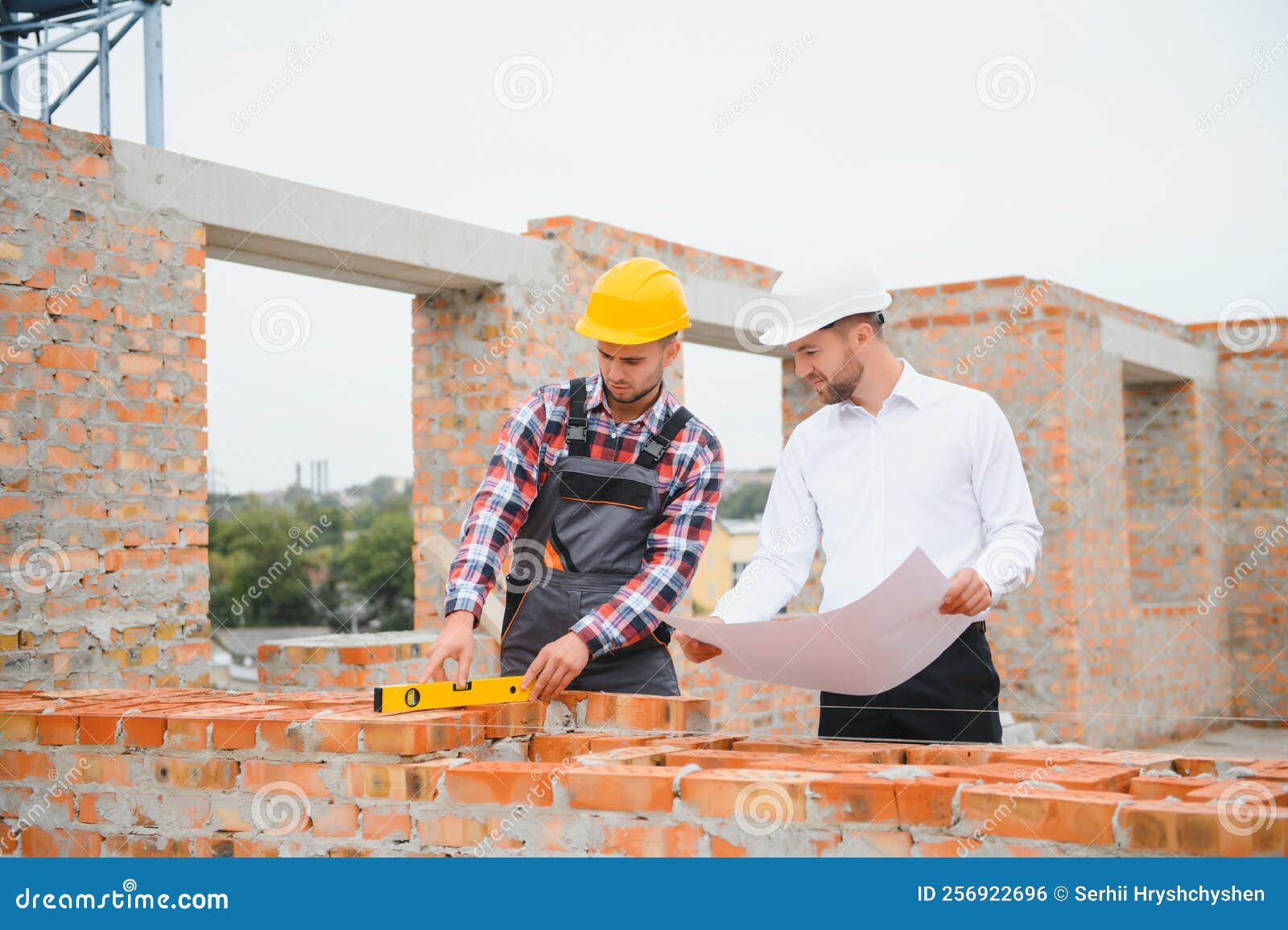 Structural Engineer and Foreman Worker Discuss, Plan Working for the ...