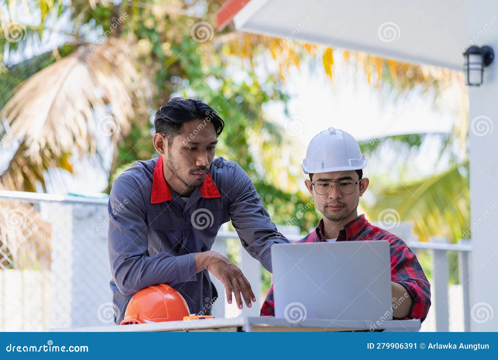 Structural Engineer and Foreman Worker with Touchpad Talking Work Plan ...