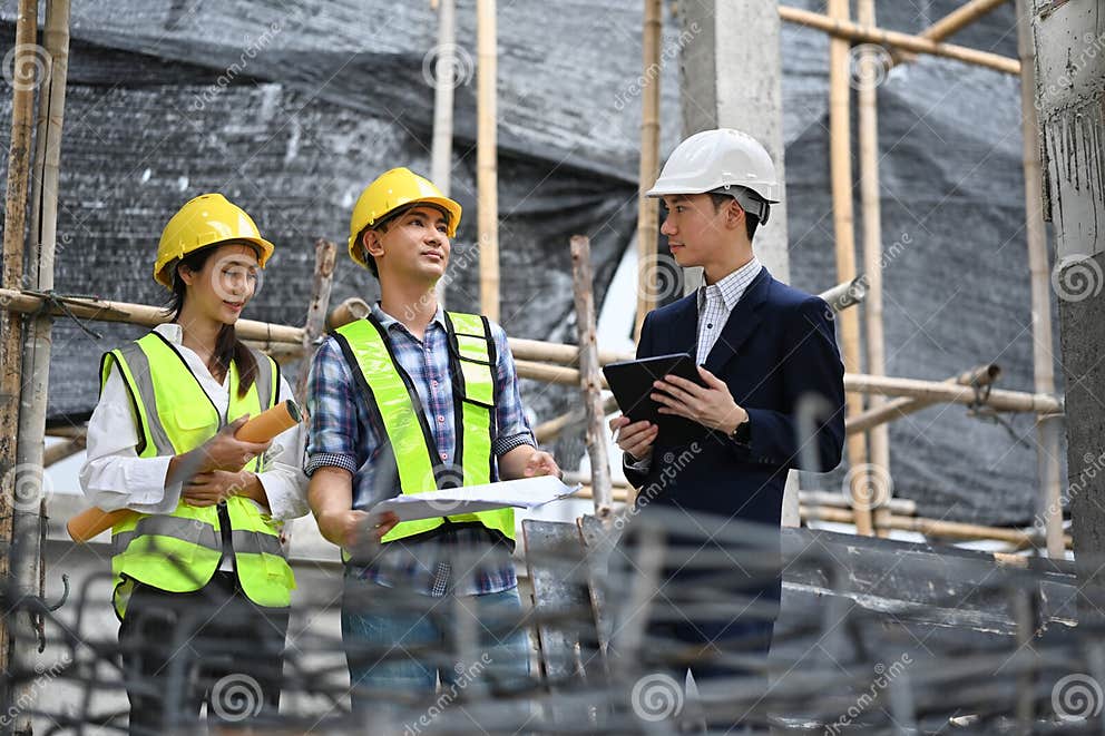 Structural Engineers Team and Businessman Planning Development Details ...