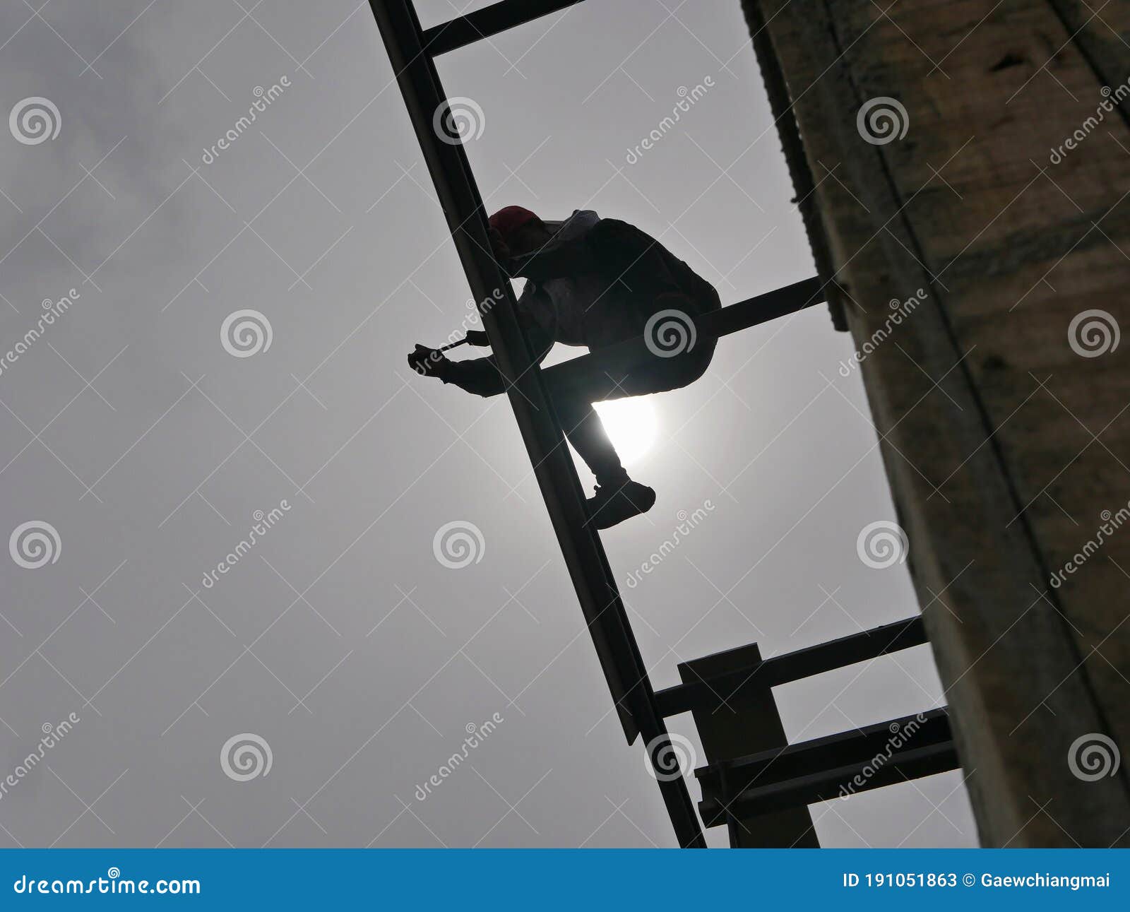 A Structural Steel Worker Working on a High Rooftop for a House Roof ...
