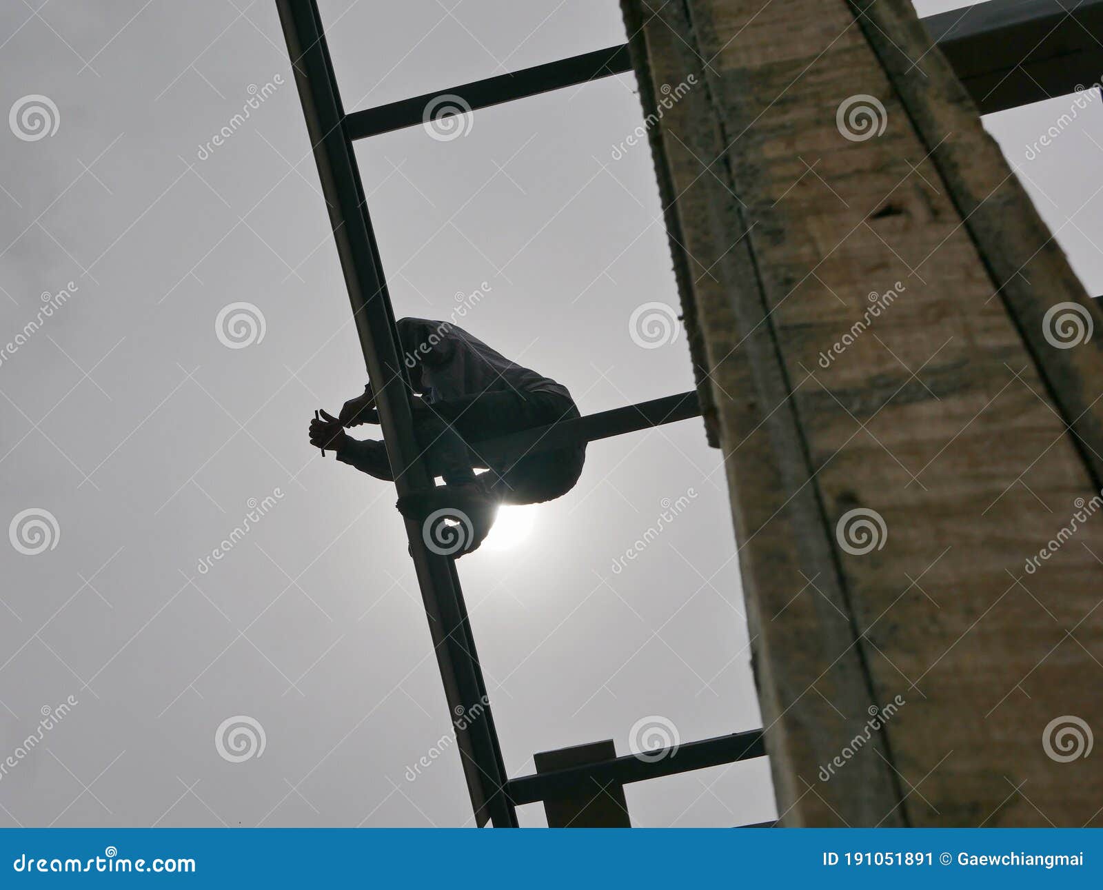 A Structural Steel Worker Working on a High Rooftop for a House Roof ...
