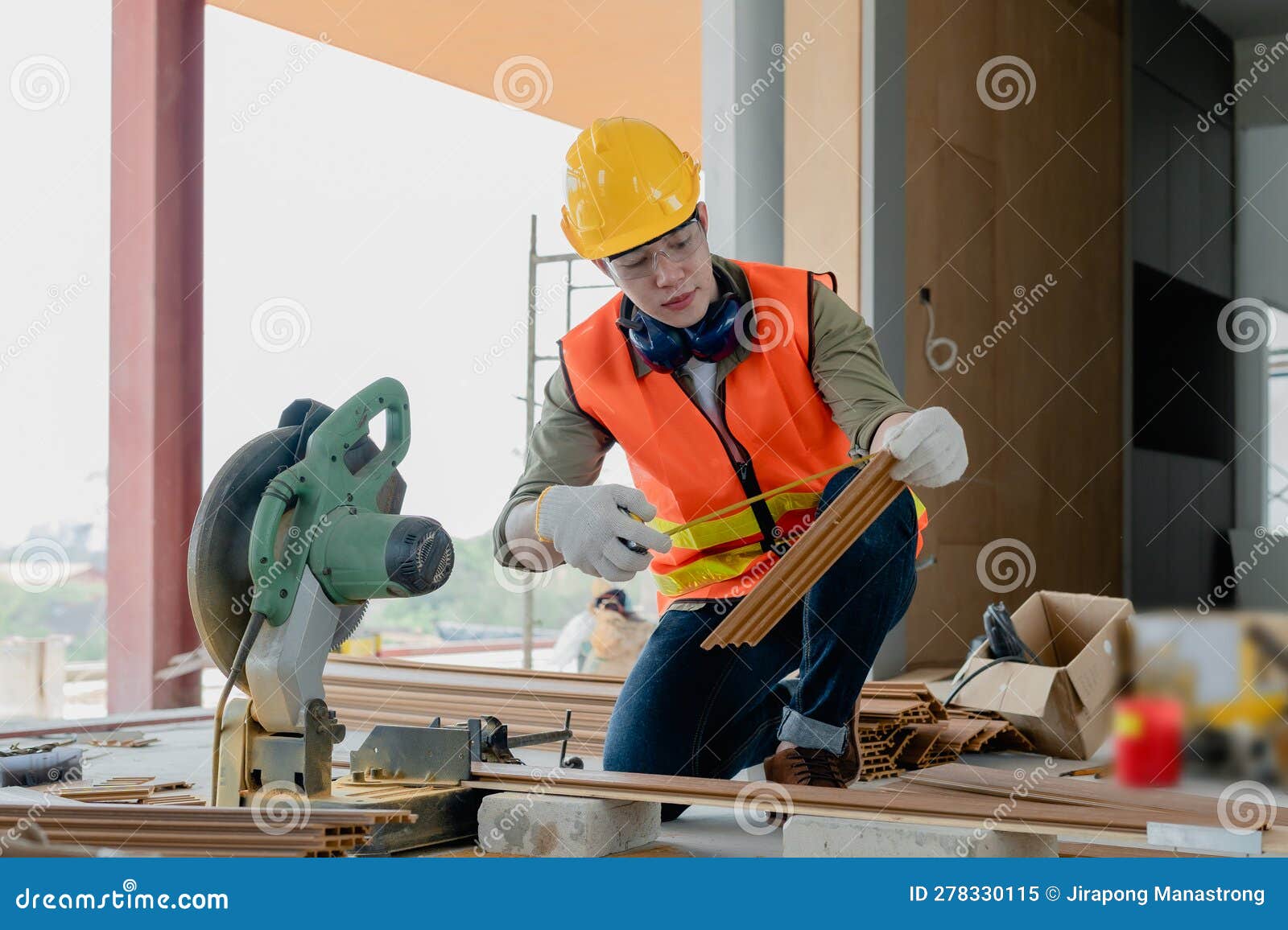 Structural Worker Dressed in Safety Gear and Hard Hat Doing ...