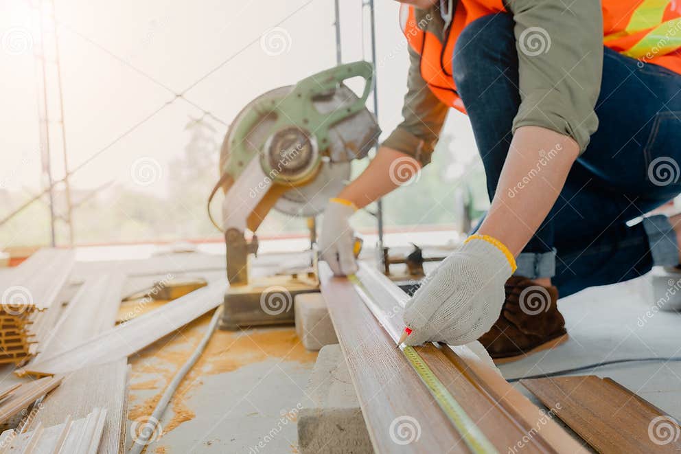 Structural Worker Dressed in Safety Gear and Hard Hat Doing ...