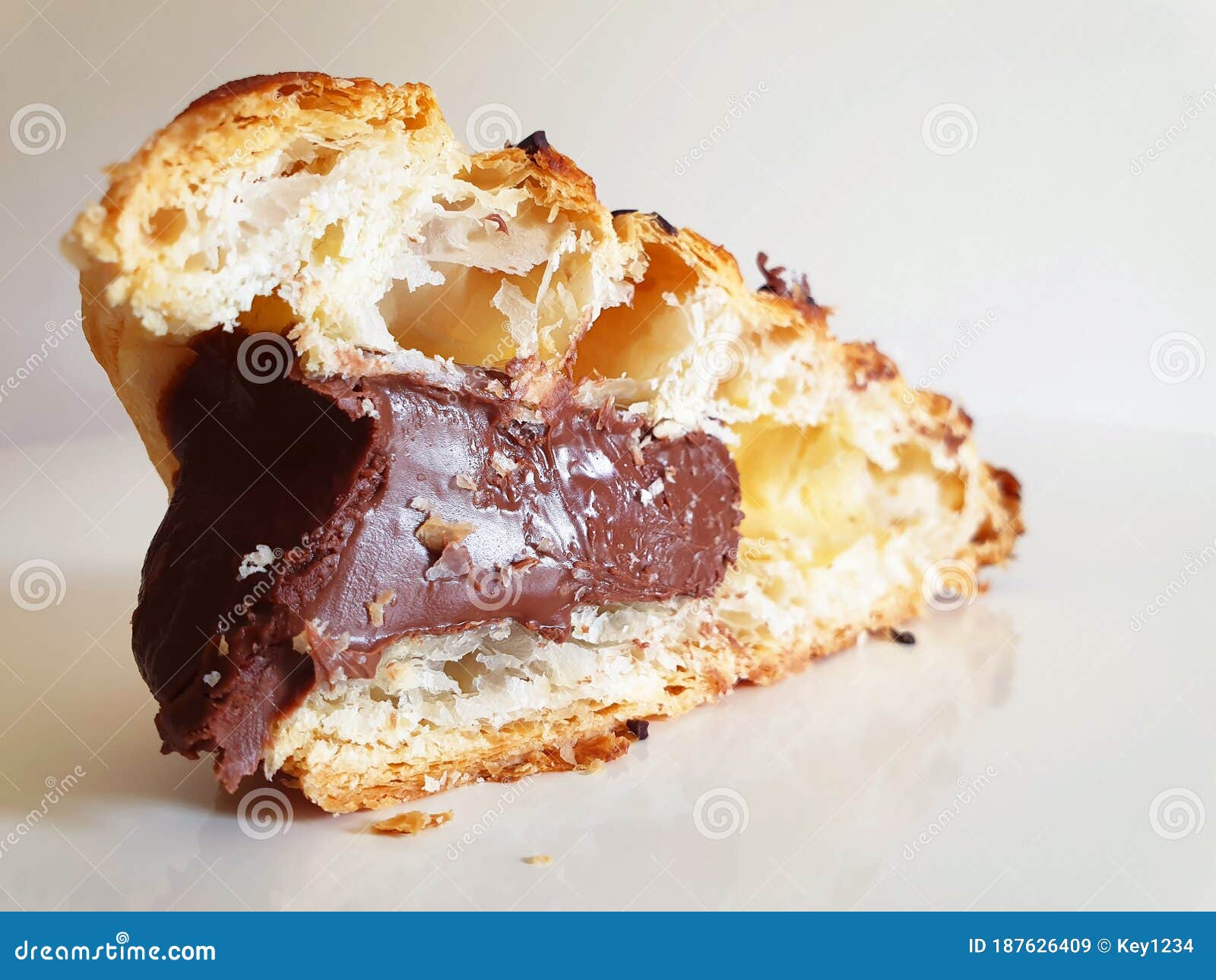 Croissant with Chocolate Filling Cut in Half. Stock Image - Image of ...