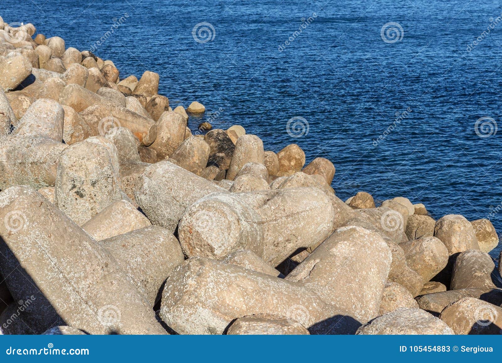 The Structure of Breakwater Wharf Seaport. Stock Image - Image of ...