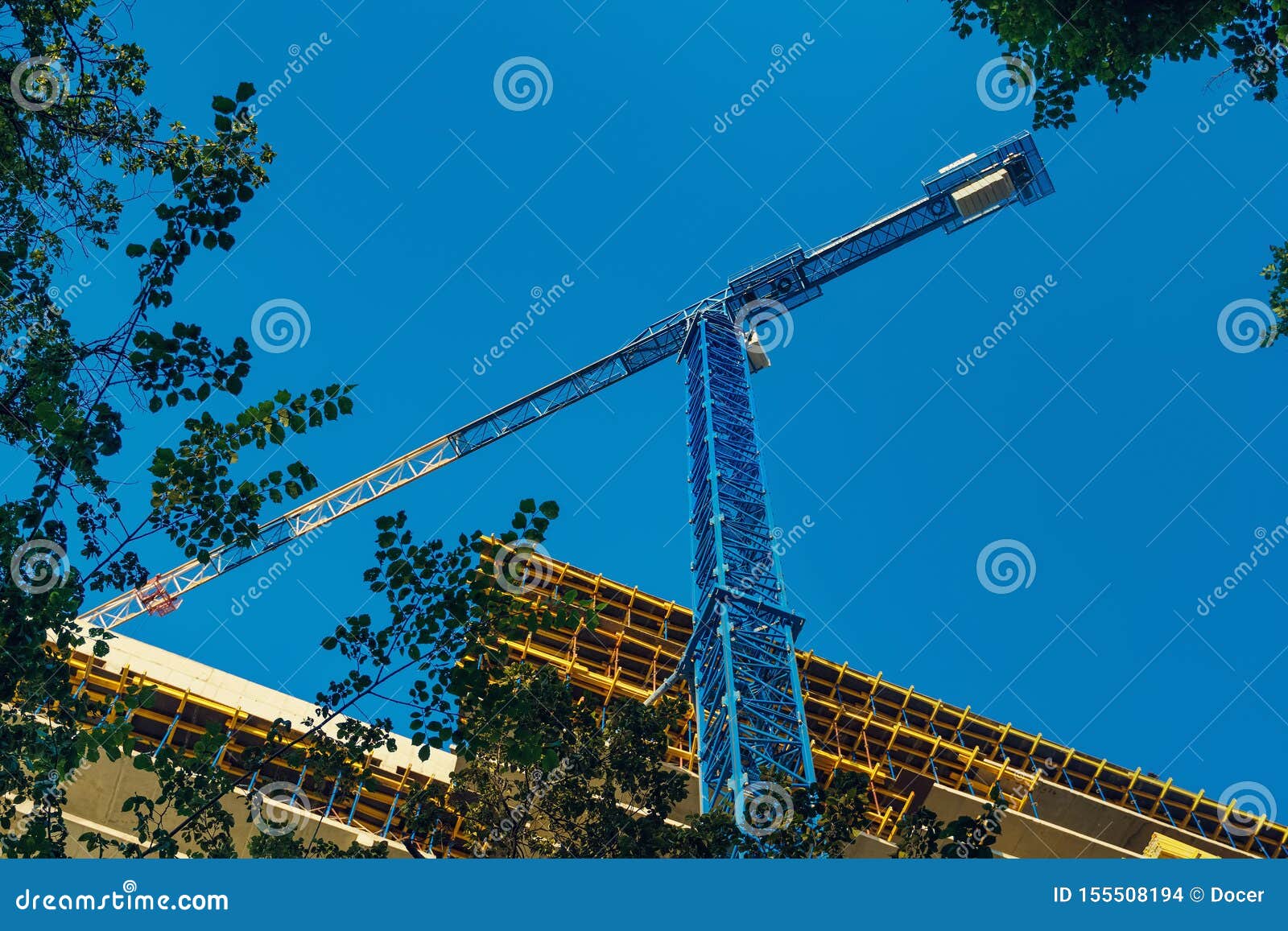 Structure of a New Concrete Building and Hoisting Crane Stock Photo ...