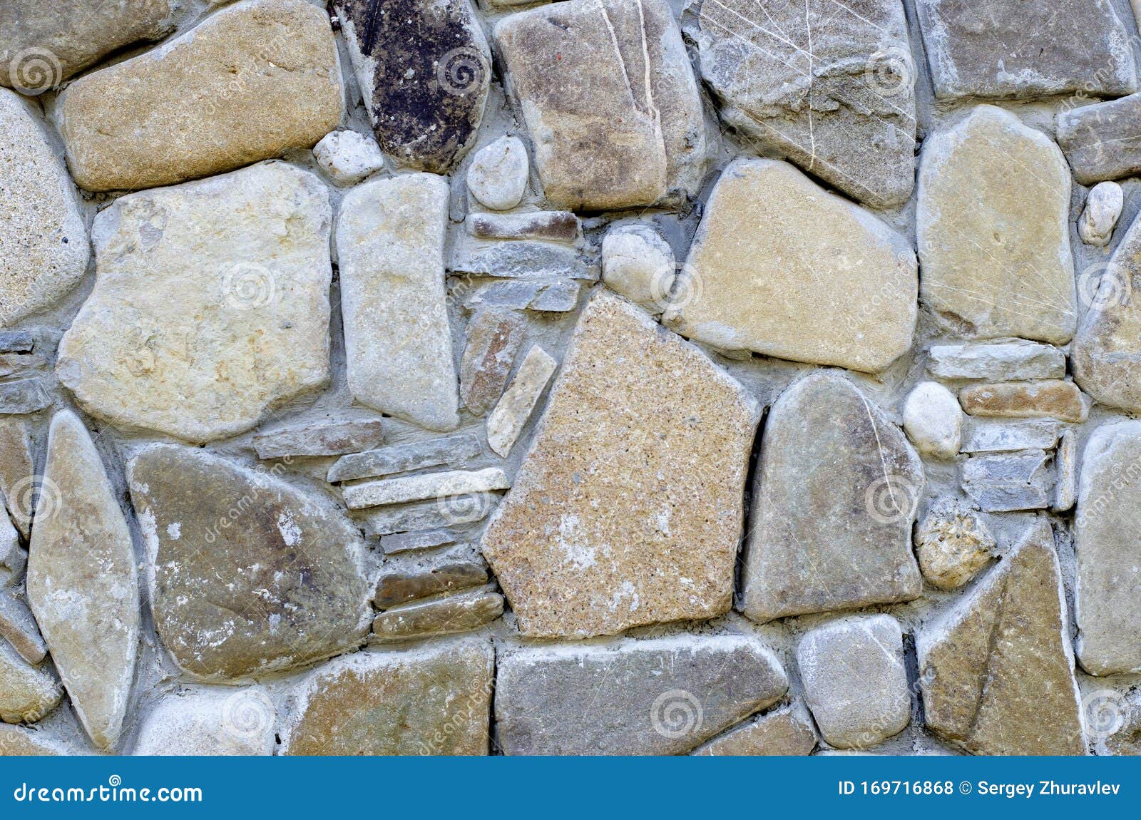 The Structure of a Stone Wall of Coarse Pebble Rocks Close Up Stock ...