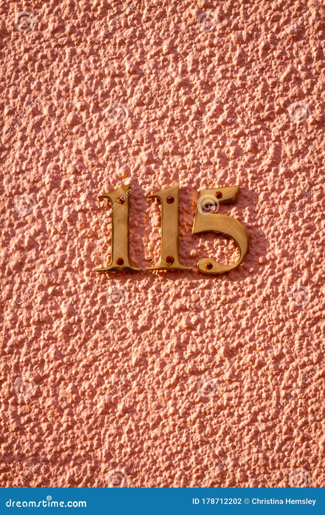 Golden House Number 115 on a Pink Plaster Wall Stock Photo - Image of ...
