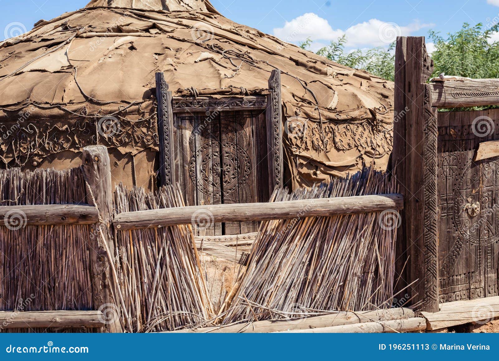 Structures Made of Branches with a Dome and a Wicker Fence Stock Image ...
