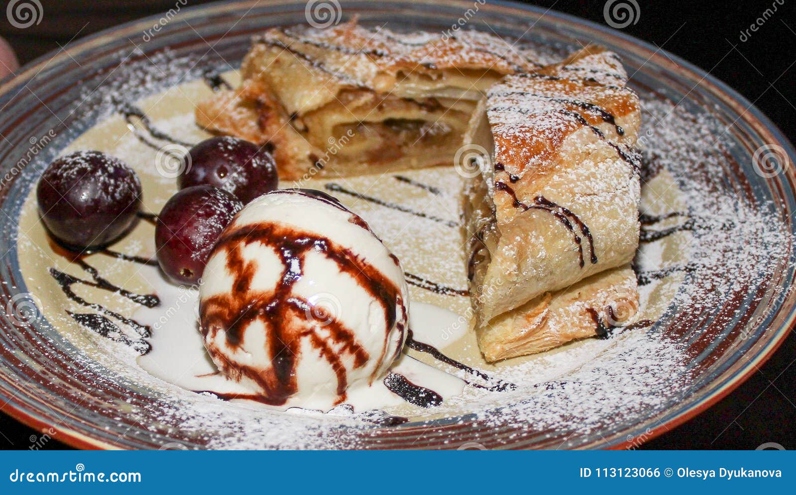 Strudel and Ice Cream on a Plate in a Night Cafe Stock Photo - Image of ...